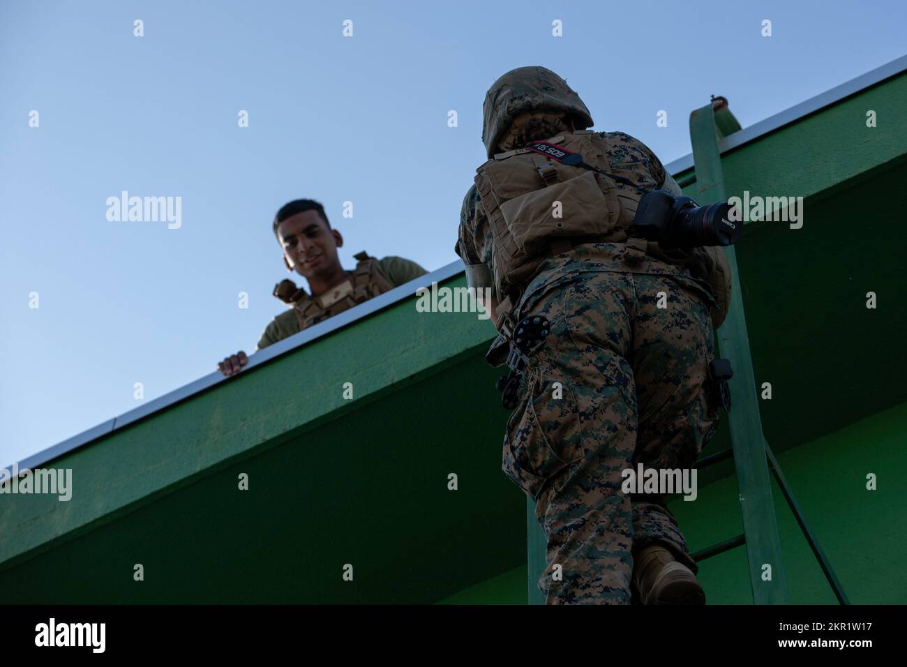U.S. Marine Corps Lance Cpl. Chloe Johnson, a combat videographer with ...
