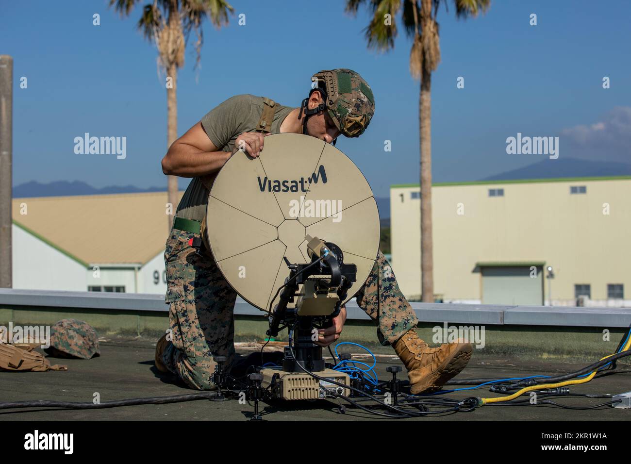 U.S. Marine Corps Cpl. Angel Torres, a satellite communications ...