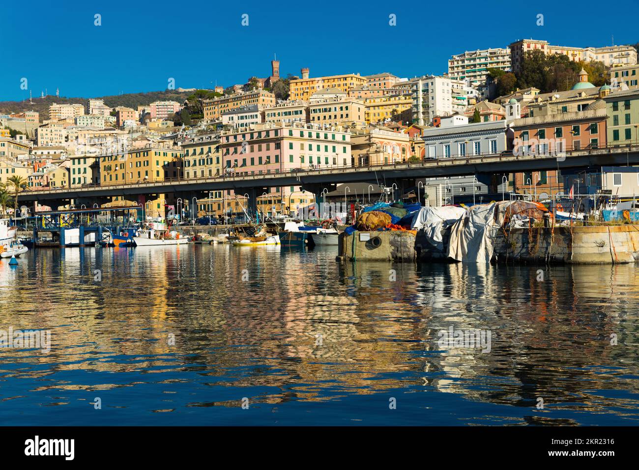 Old port of Genova and boats from sea view in Italy Stock Photo - Alamy