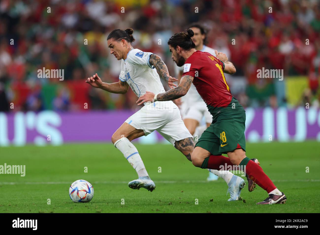 Lusail, Qatar. 28th Nov, 2022. (L to R) Darwin Nunez (URY), Ruben Neves ...