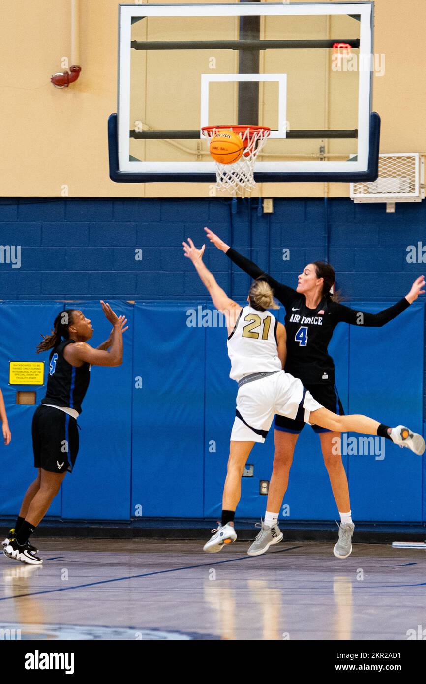 U.S. Navy Lt. Cmdr. Whitney Buffin, a member of team Navy, shoots the ...