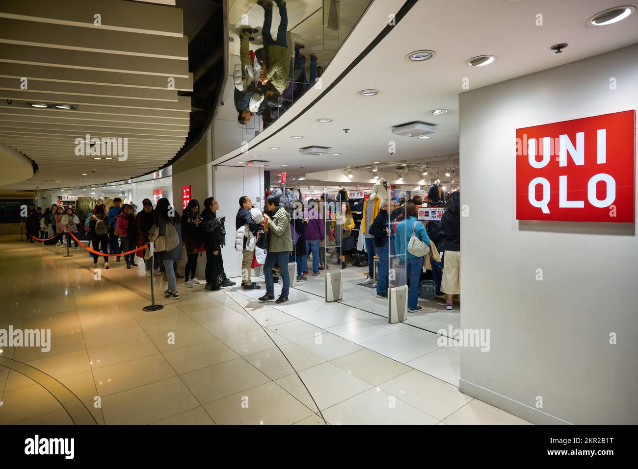 HONG KONG - CIRCA DECEMBER, 2019: people staying in queue at Uniqlo ...