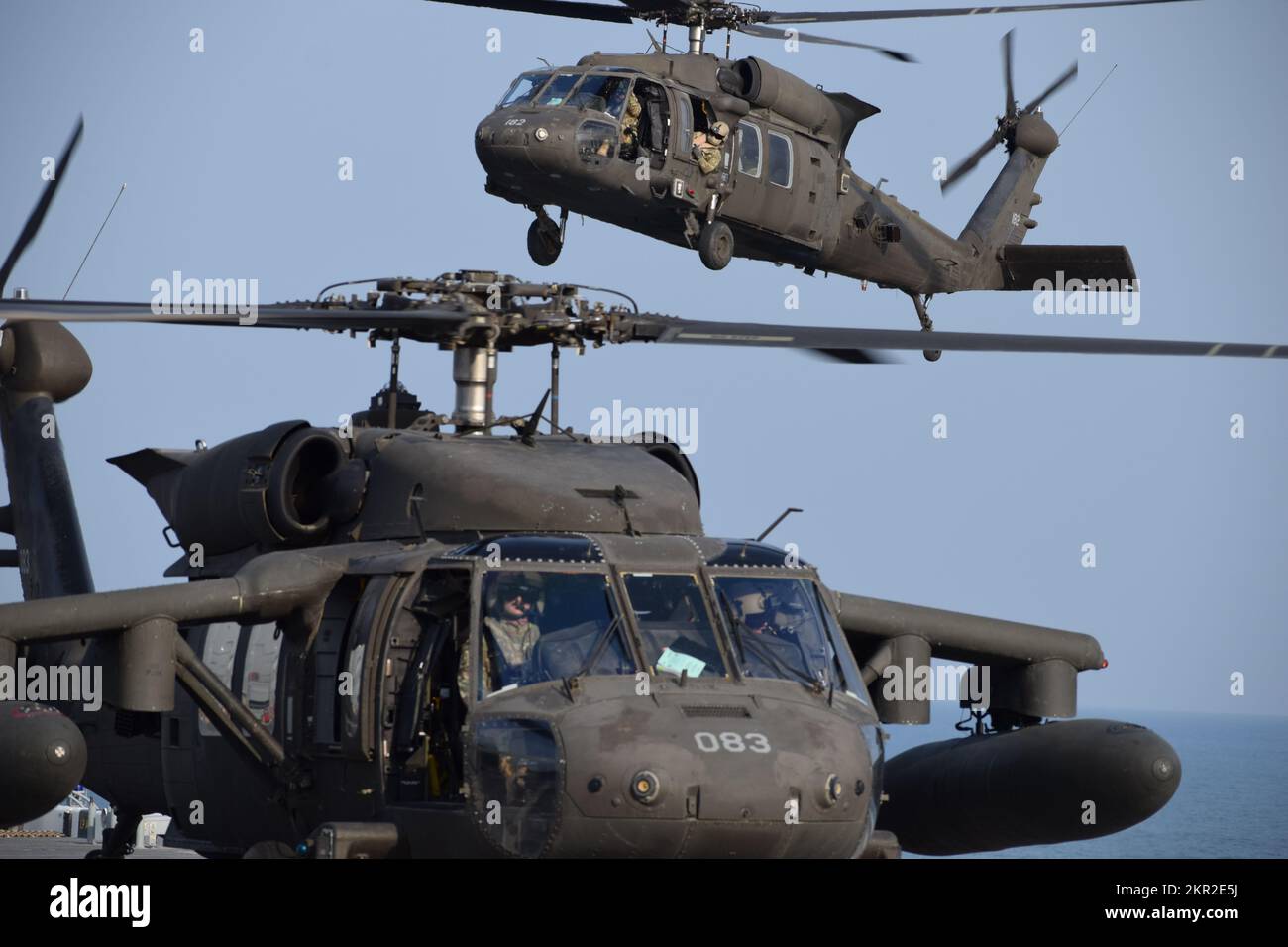 Two U.S. Army UH-60M Black Hawk helicopters from 3rd Battalion, 142nd ...