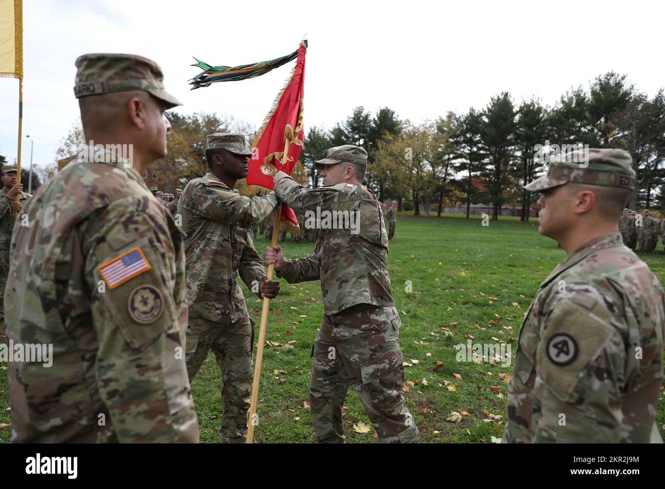 U.S. Army Command Sgt. Maj. Ian Brundage, center right, outgoing ...