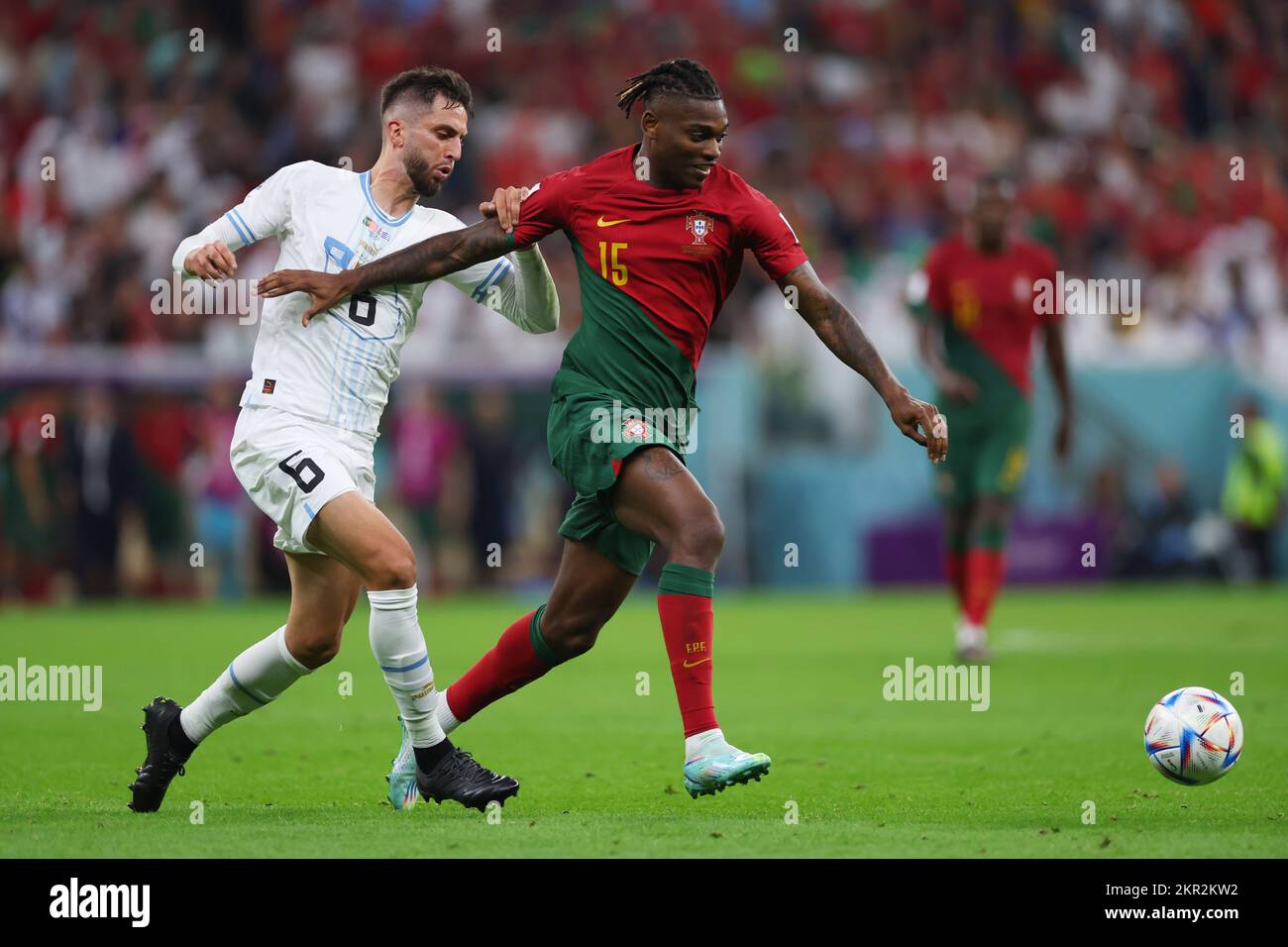 Lusail, Qatar. 28th Nov, 2022. (L to R) Rodrigo Bentancur (URY), Rafael Leao (POR) Football ...