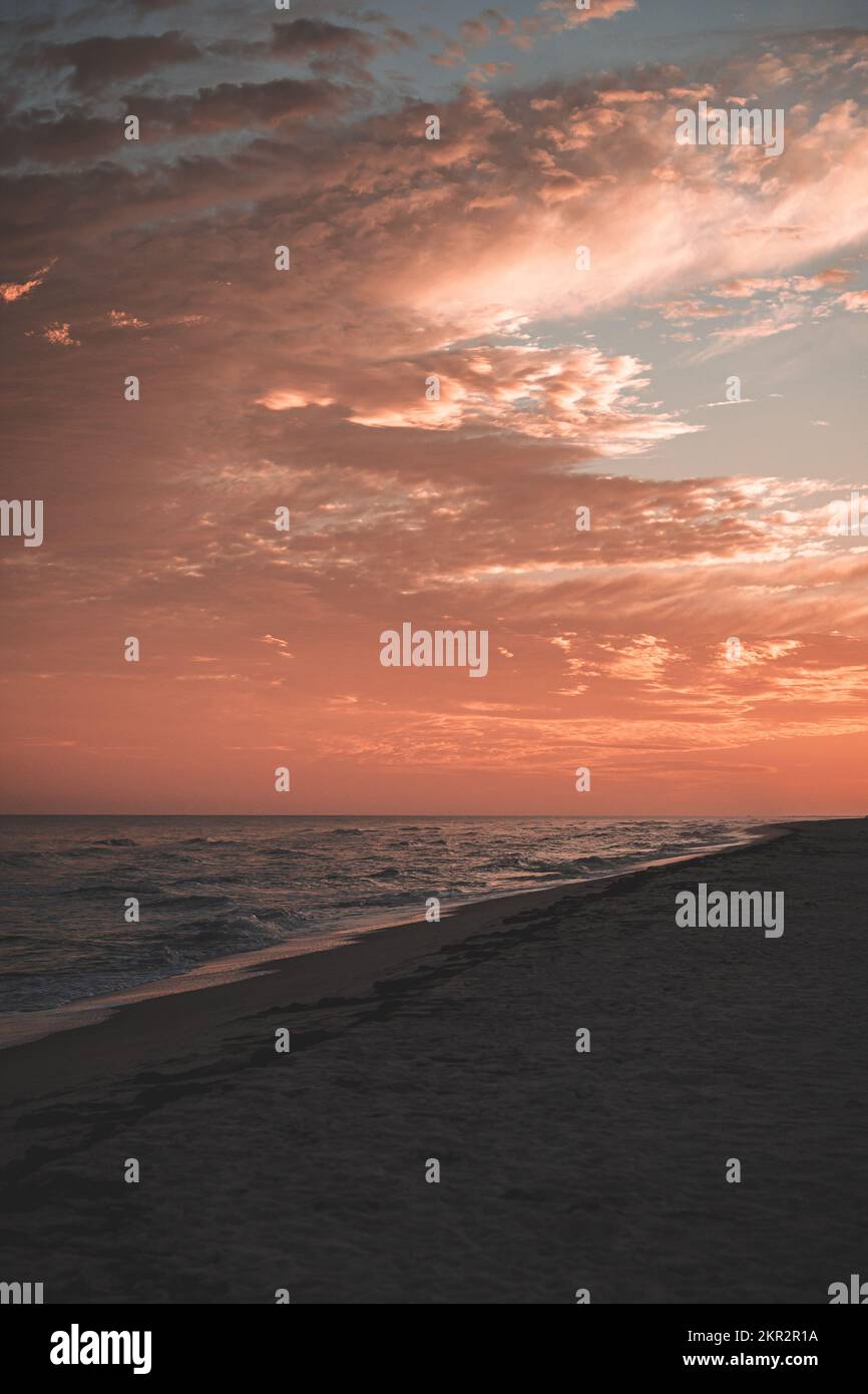 An Image of a Beach Front During an Incredible Sunset Filled with Color ...