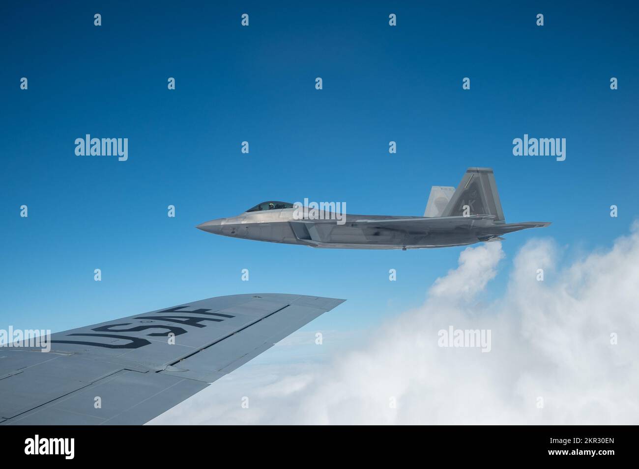 An f 22 raptor flies over kadena air base hi-res stock photography and ...