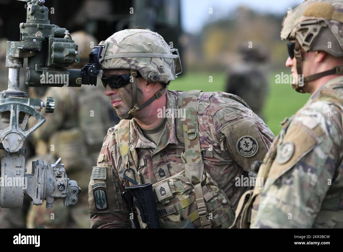 U.S. Soldiers assigned to C Battery, Field Artillery Squadron, 2nd Cavalry Regiment, sight in a ...