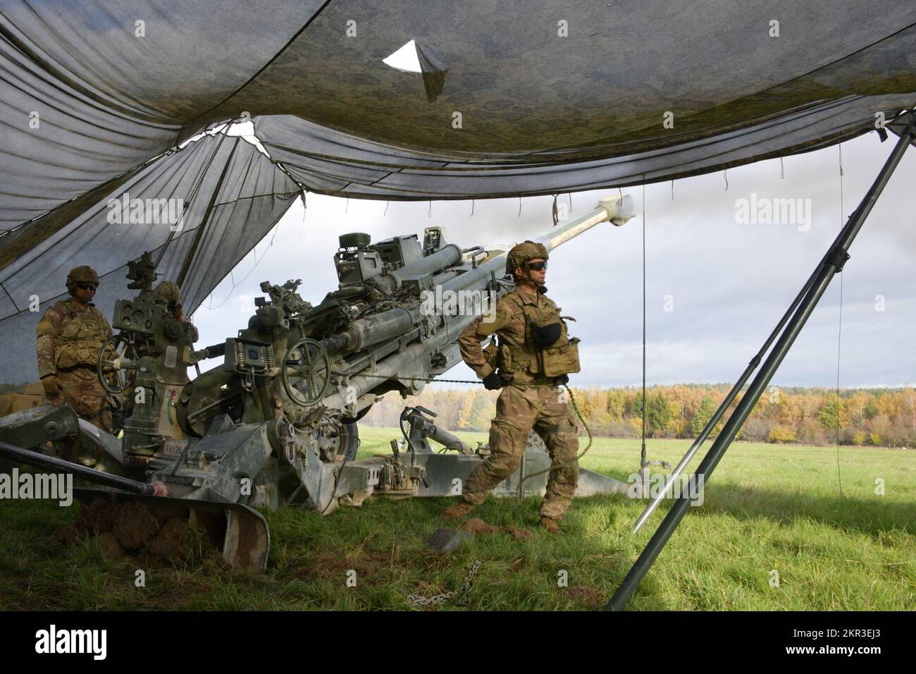 U.S. Soldiers assigned to C Battery, Field Artillery Squadron, 2nd Cavalry Regiment, fire a ...