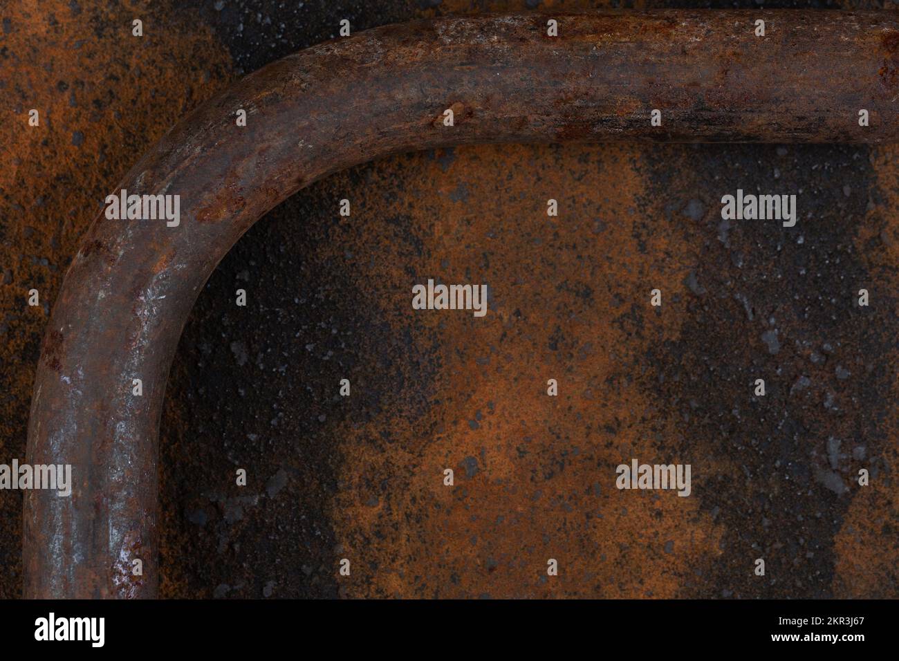 Old rusty valve pipes on rusty metal wall background Stock Photo - Alamy
