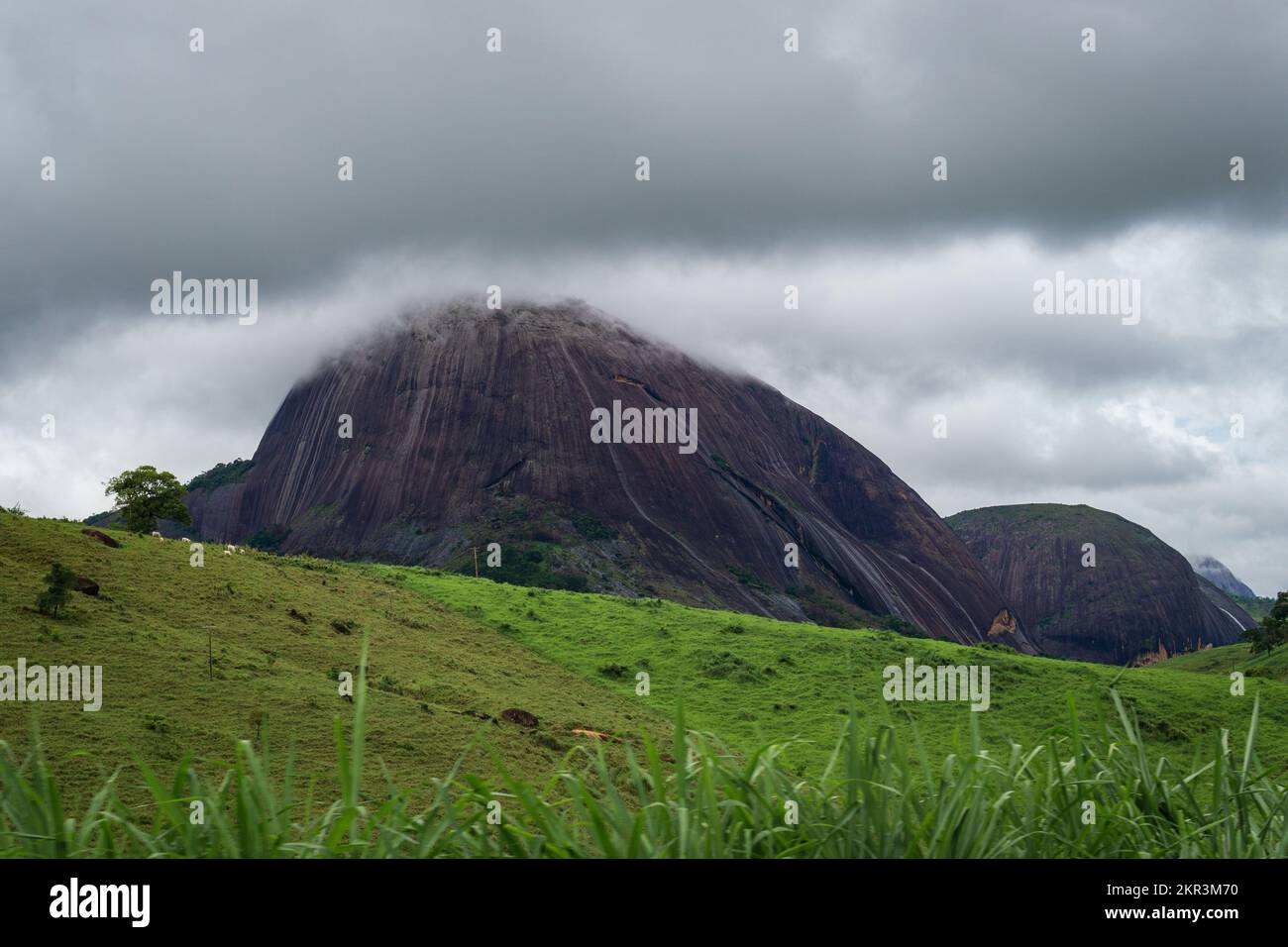 View of rock mountains, farmland, and hills near Teófilo Otoni, Carlos ...