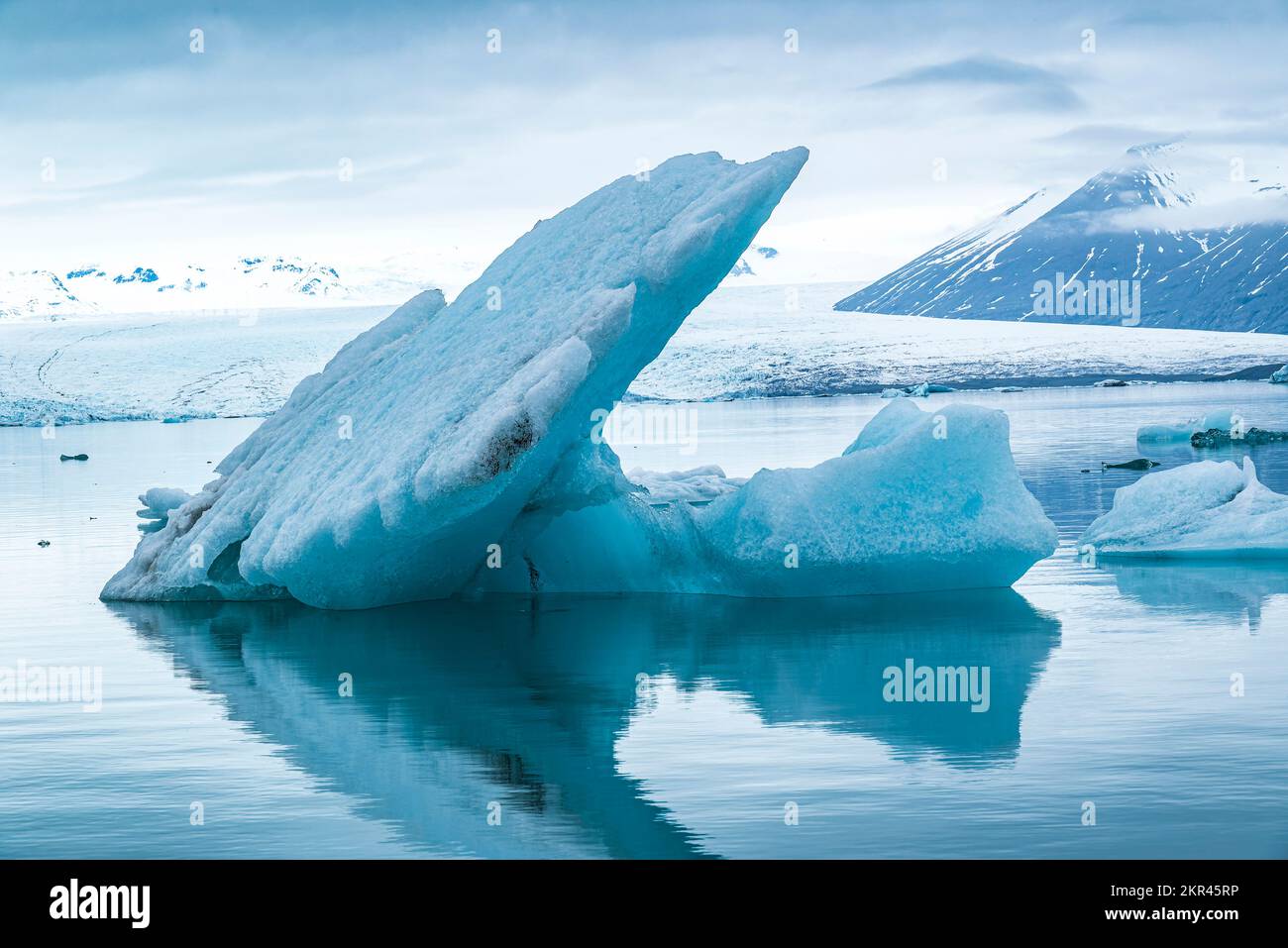 Bizarre shaped iceberg floating in the Jökulsárlón glacier lagoon ...