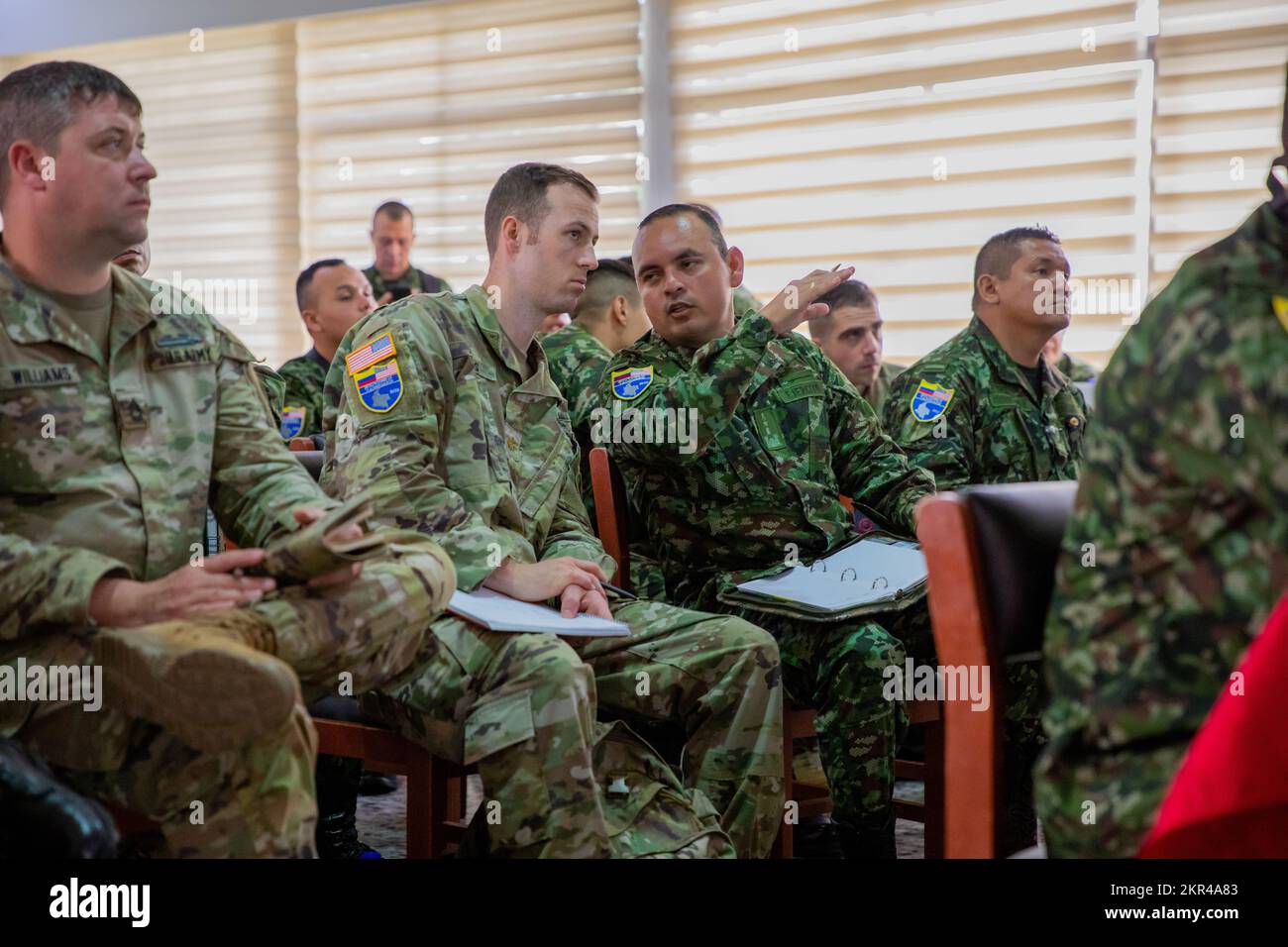 Staff officers and noncommissioned officers from the U.S. and Colombian Armies receive the ...
