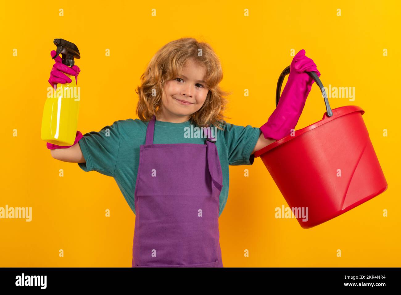 Child cleans at home concept. Kid cleaning with mop to help with ...