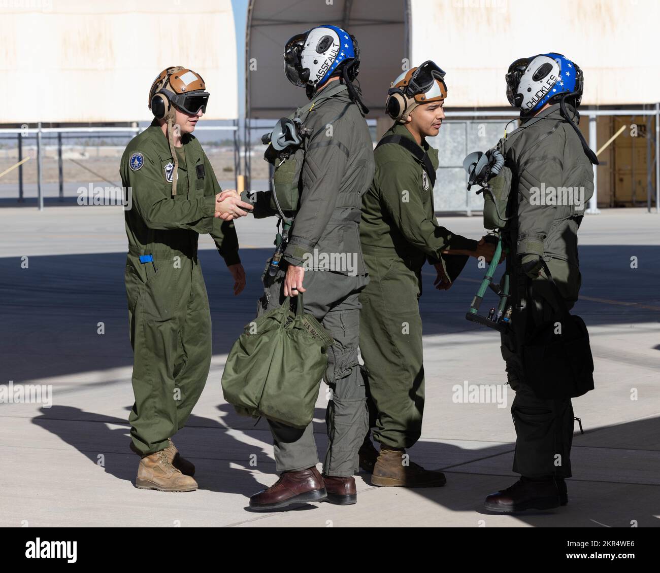 U.S. Marine Corps Lt. Col. Christopher Kelly, second from left ...
