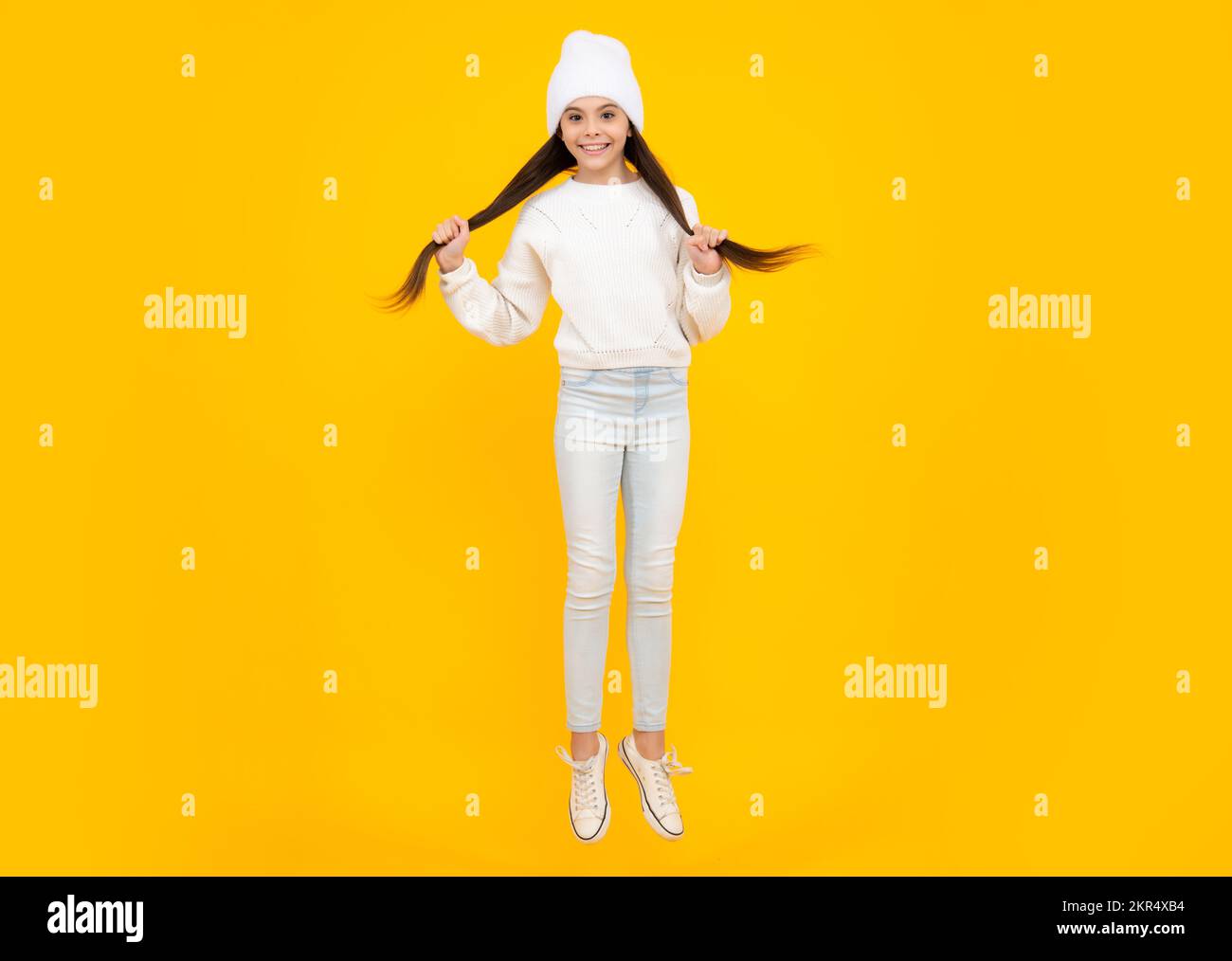 Full length overjoyed teenager kid girl 12 13 14 year jumping old ...