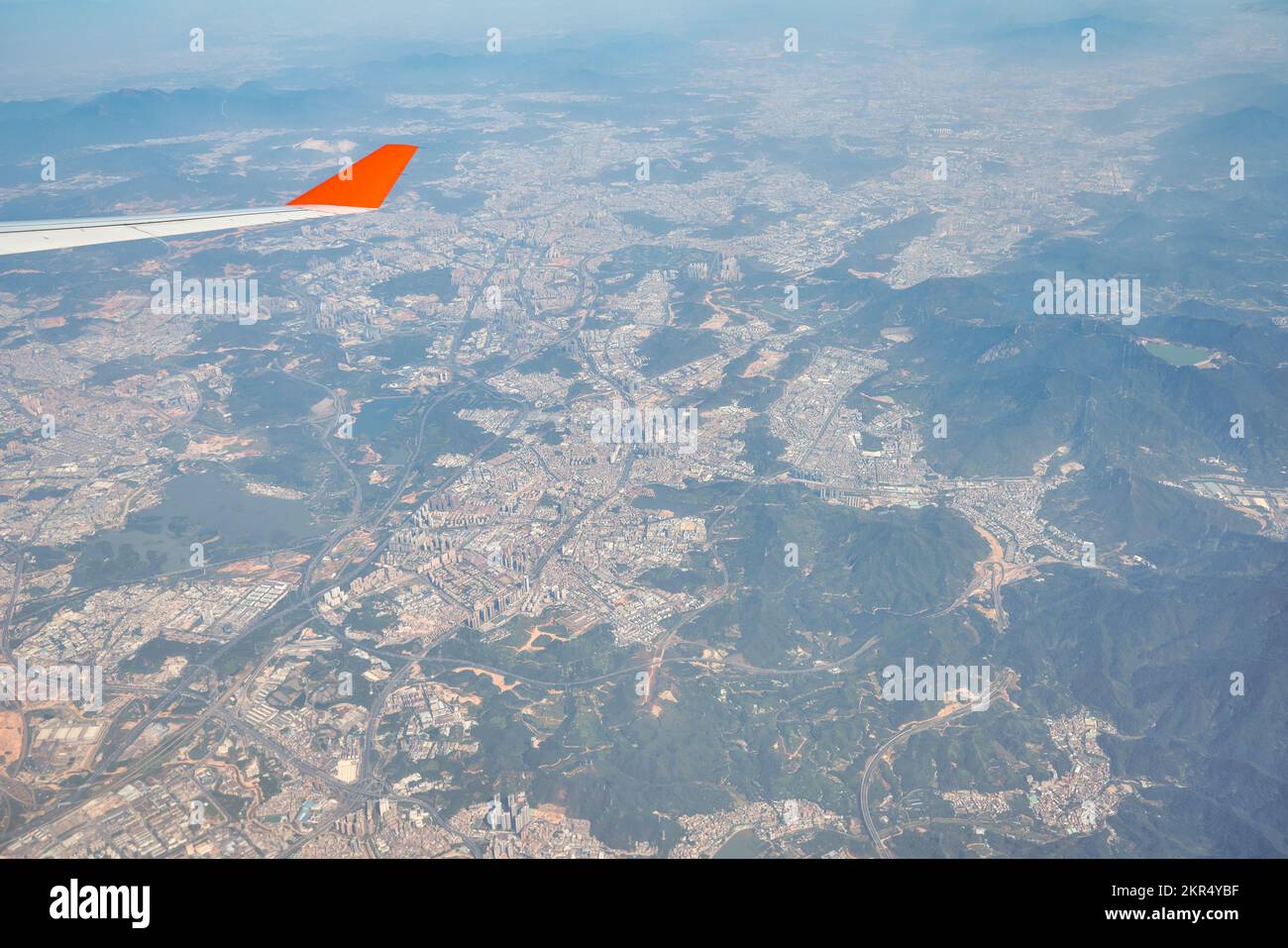 Aerial view from jet aircraft after take-off from Hong Kong ...