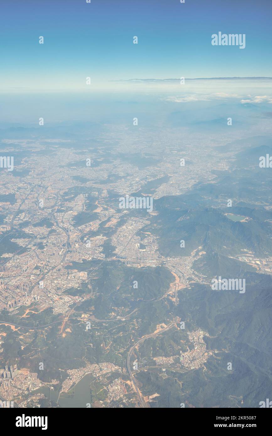 Aerial view from jet aircraft after take-off from Hong Kong ...