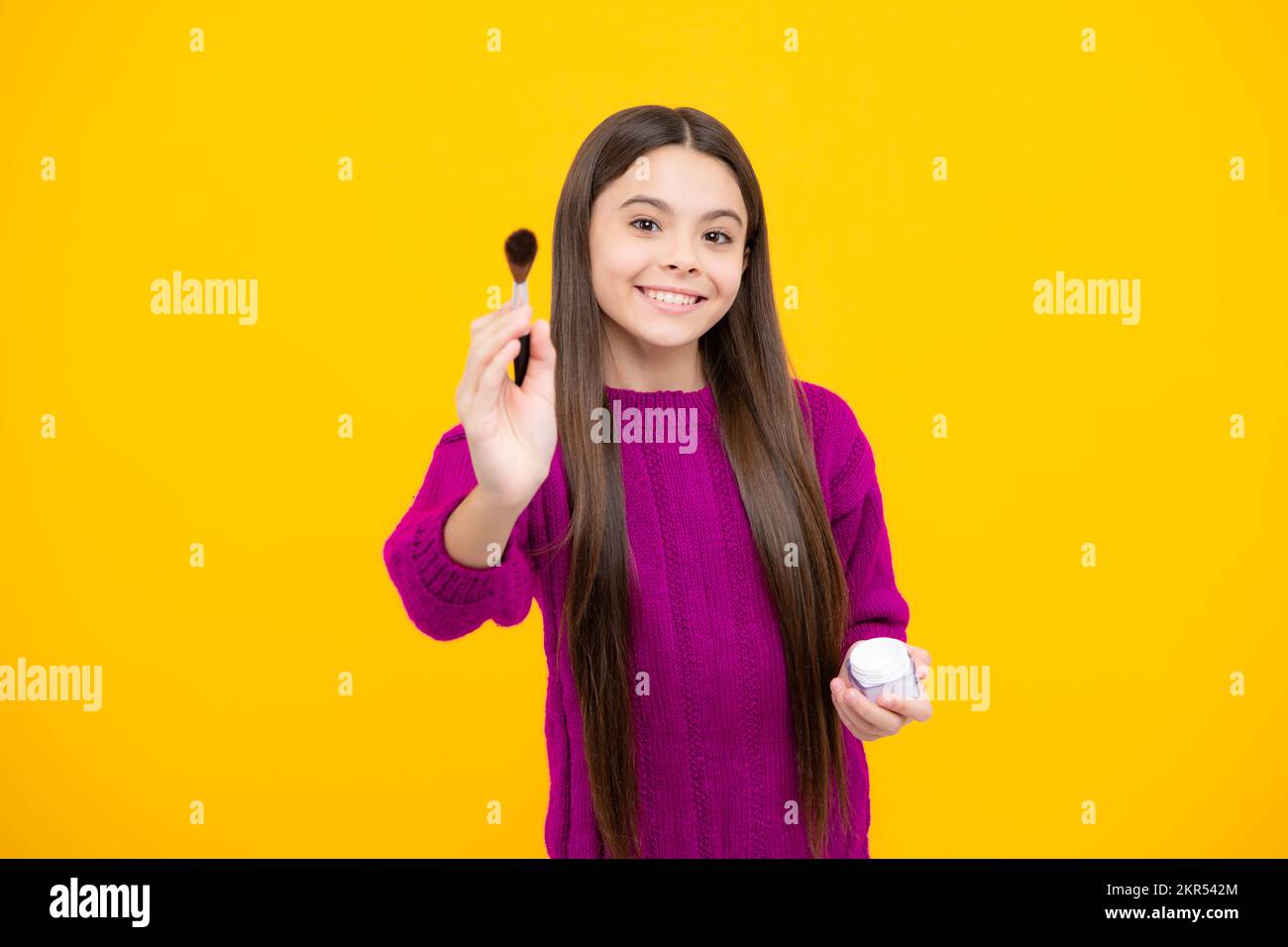 Beautiful portrait of teen girl child artist apply powder with make up ...