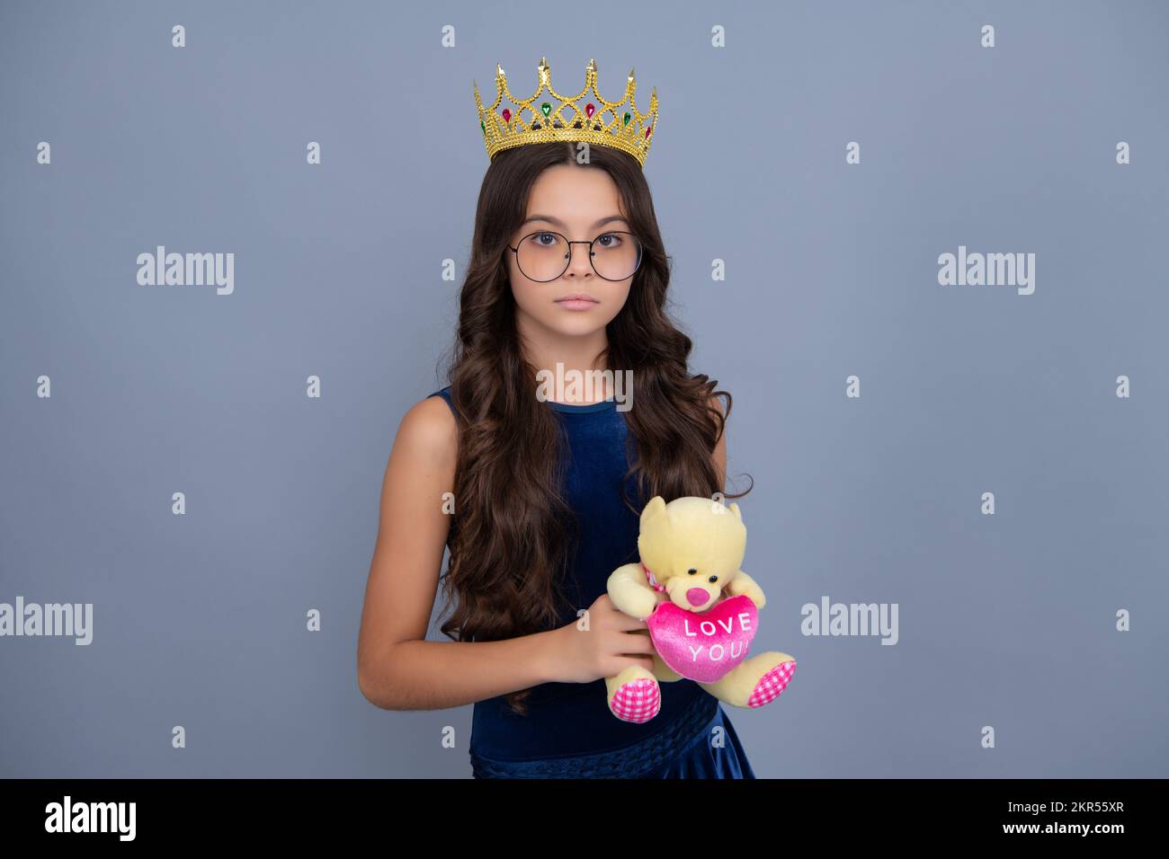 Birthday kids prom party. Little queen wearing golden crown. Teenage ...