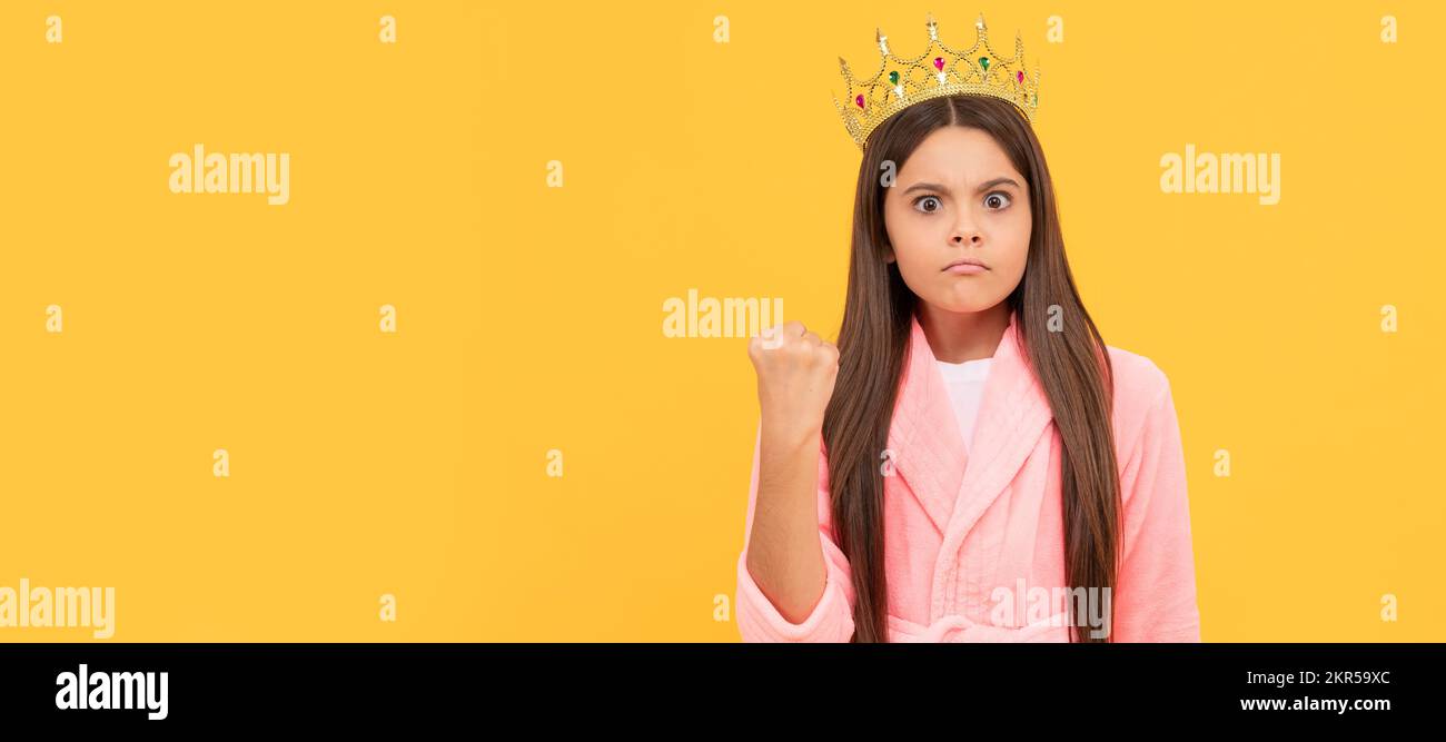 angry selfish teen girl in home terry bathrobe and princess crown ...