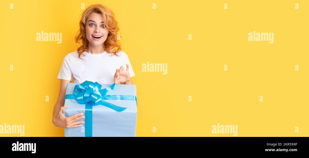 surprised redhead girl open gift box. boxing day. Beauty woman isolated ...