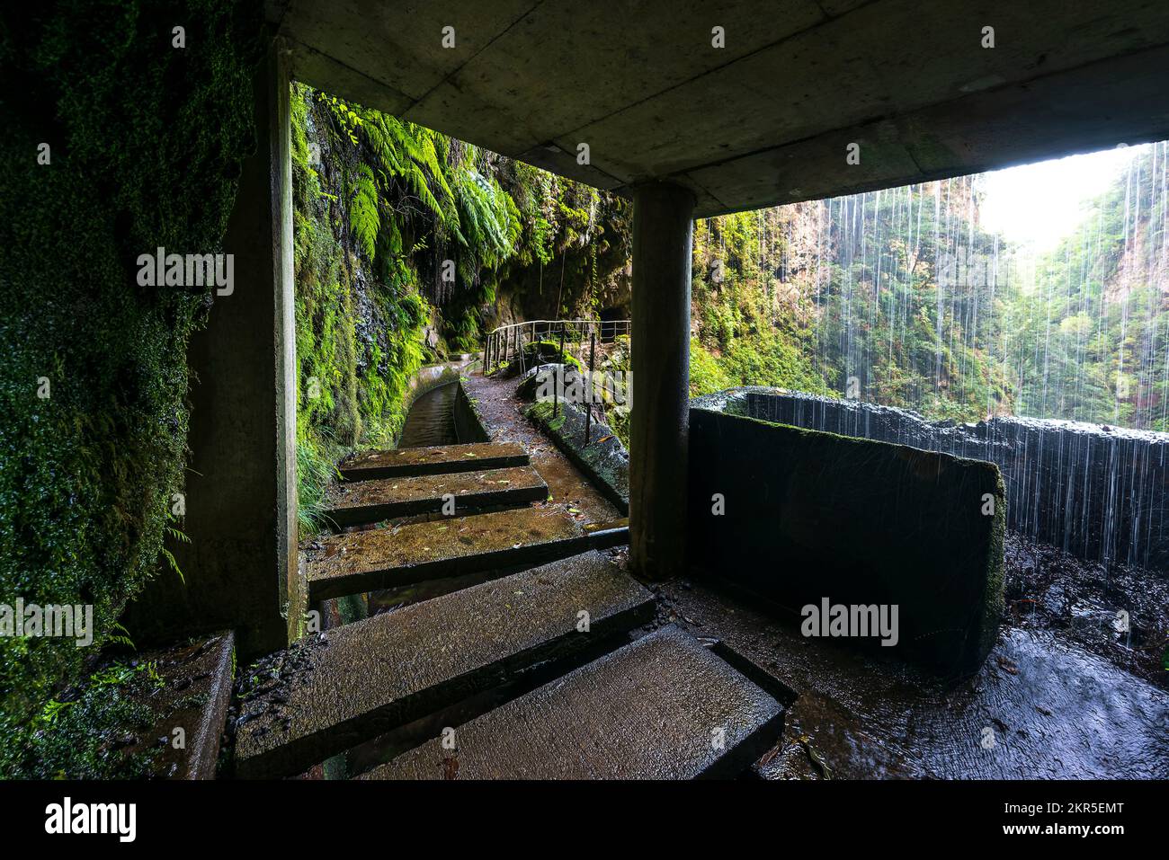 View from inside the small hut under a waterfall at the "Levada da ...