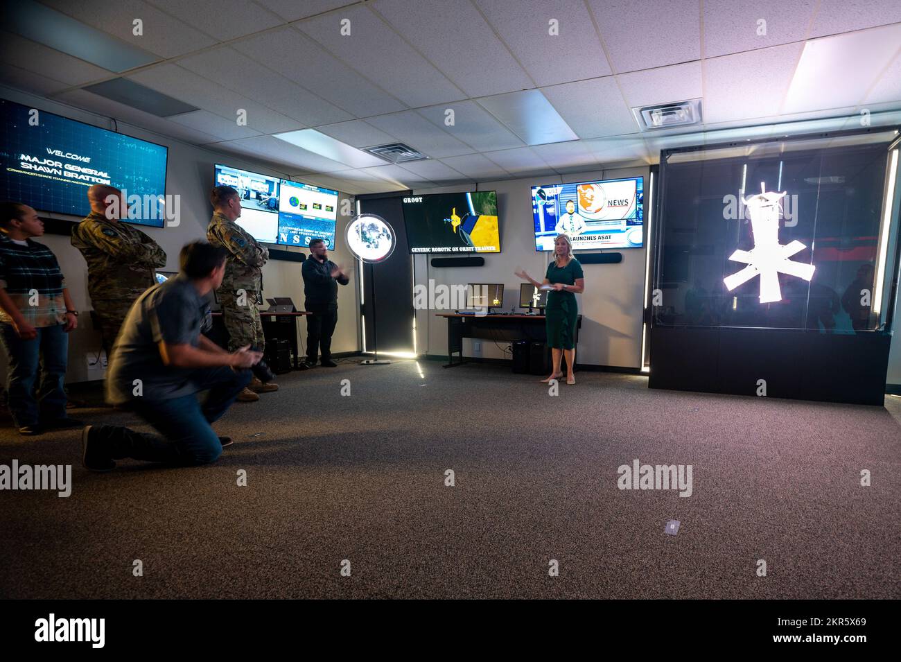 Staff with the National Security Space Institute hold a demonstration ...