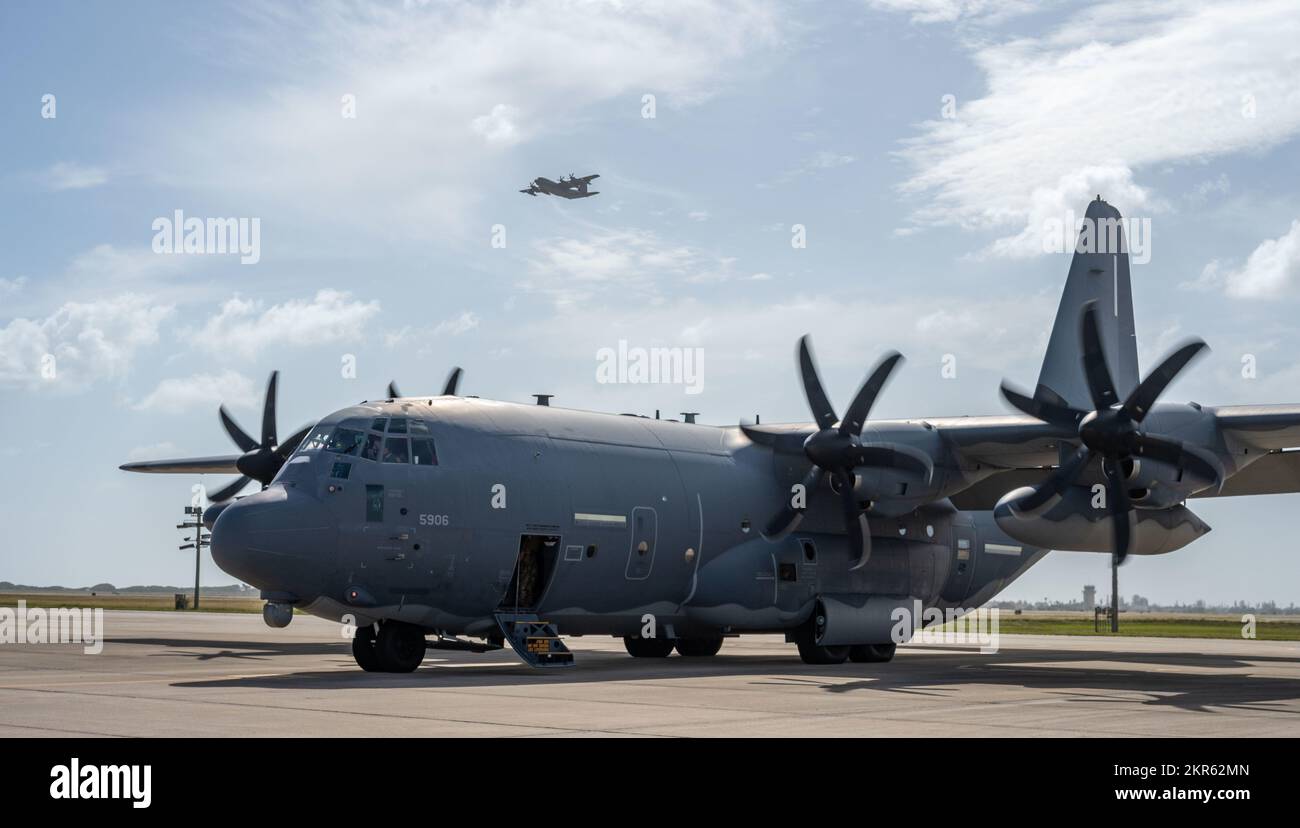 An HC-130J Combat King II flies over an HC-130J Combat King II as it ...