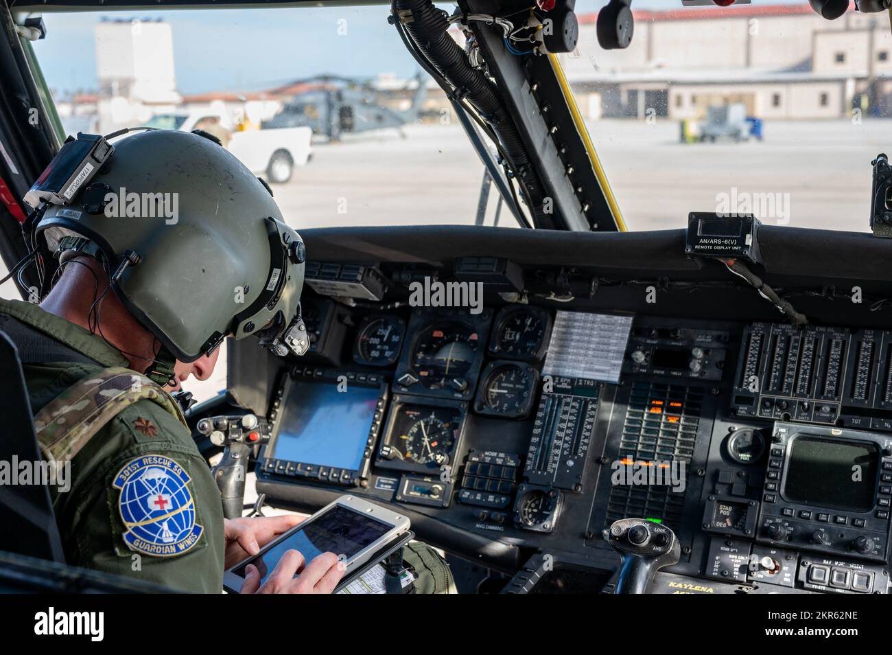 Maj. Alex Layendecker, 301st Rescue Squadron pilot, prepares to fly an ...