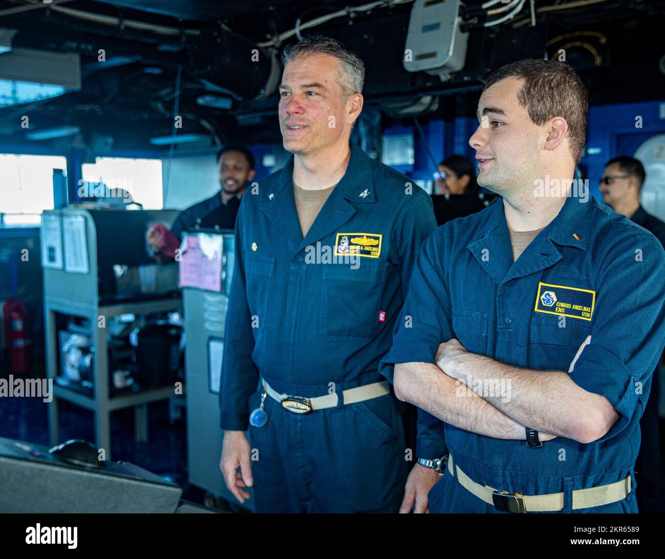 PHILIPPINE SEA (Nov. 8, 2022) Ensign Edward Angelinas, speaks with his father, Capt. Edward ...