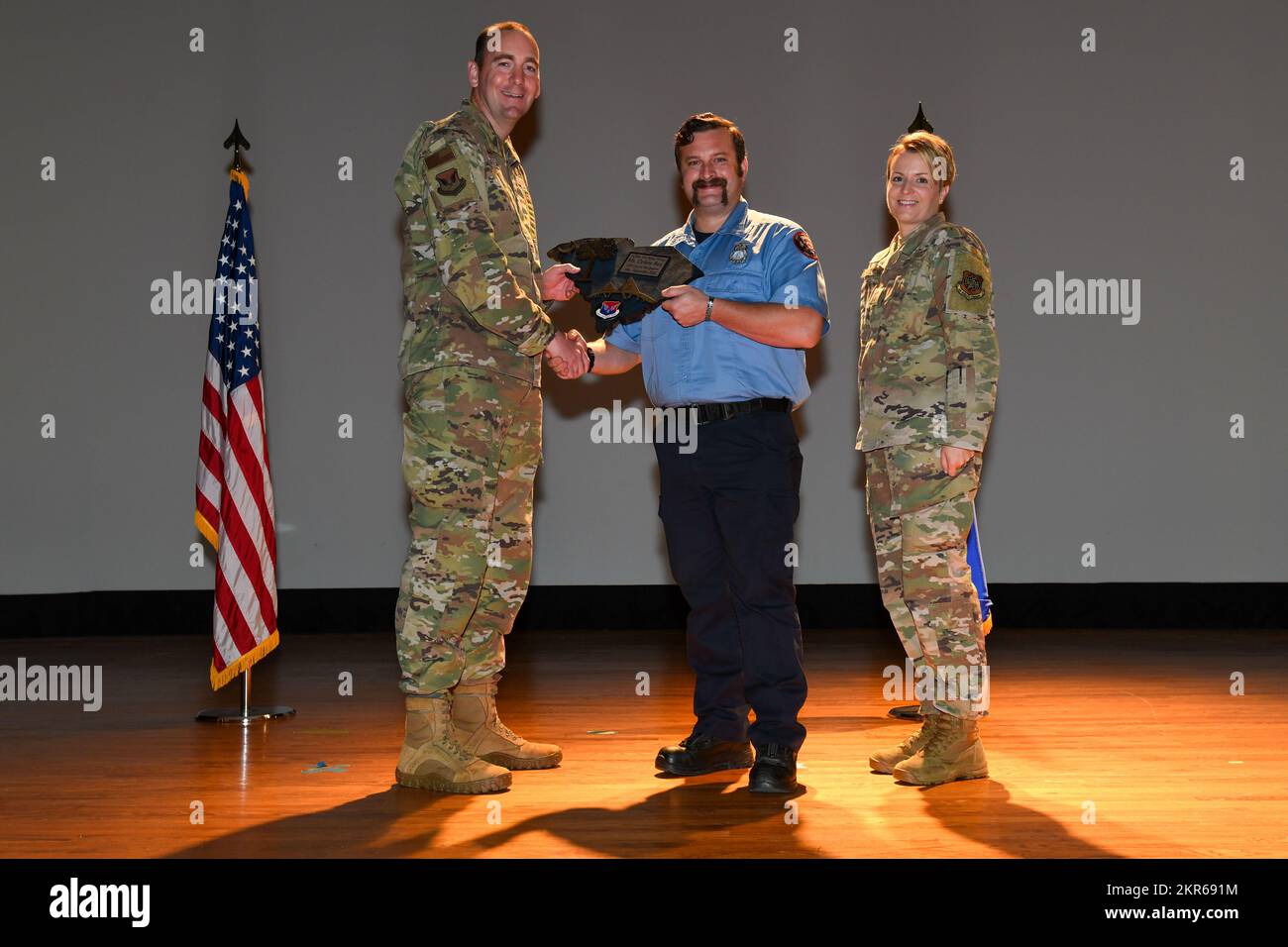 Airmen from the 628th Air Base Wing receive their quarterly award from ...