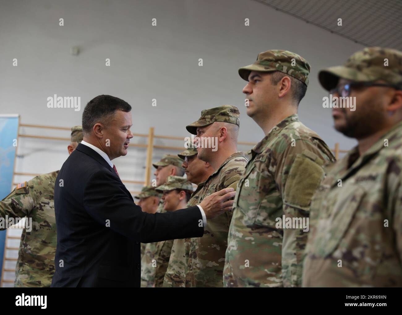 Mr. Tommy R. Mize, left, director, Installation Management Command ...