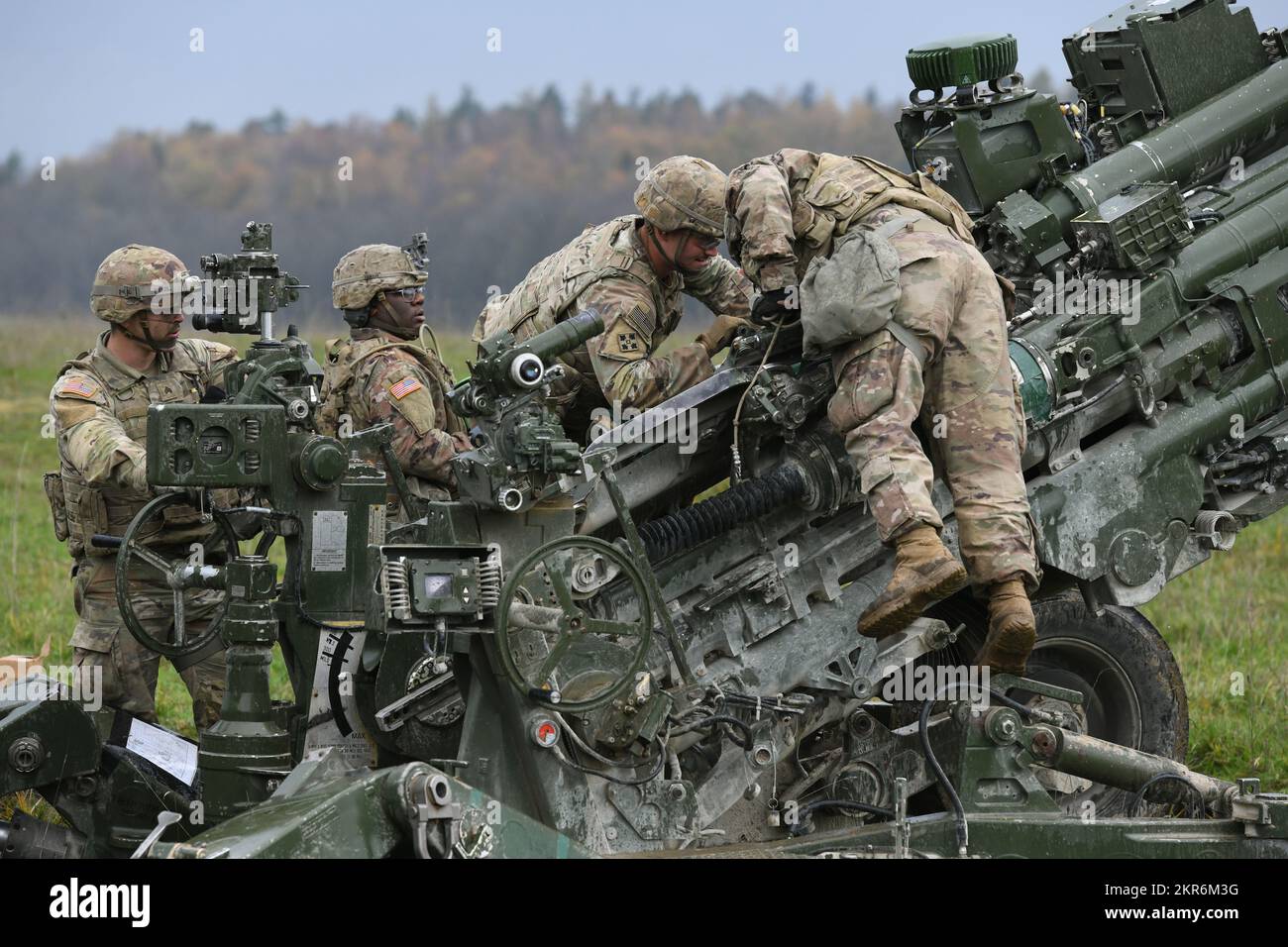 U.S. Soldiers assigned to A Battery, Field Artillery Squadron, 2nd Cavalry Regiment, prepare a ...