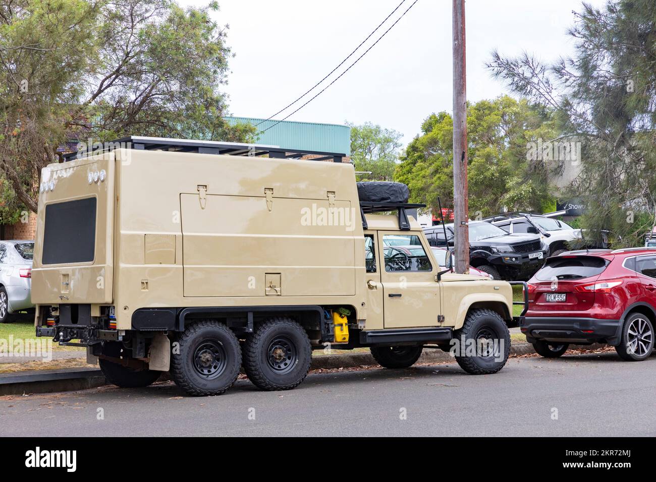 Heavily modified Land Rover Defender transformed into a 6 six wheel ...