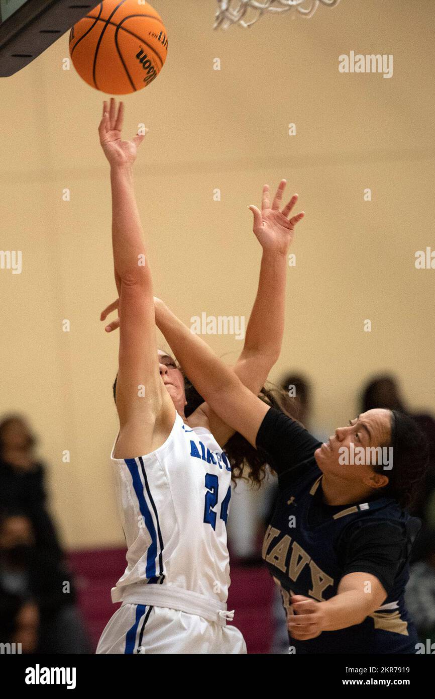 Air Force Staff Sgt. Courtney Saunds draws a file for a three point play during the 2022 Armed ...