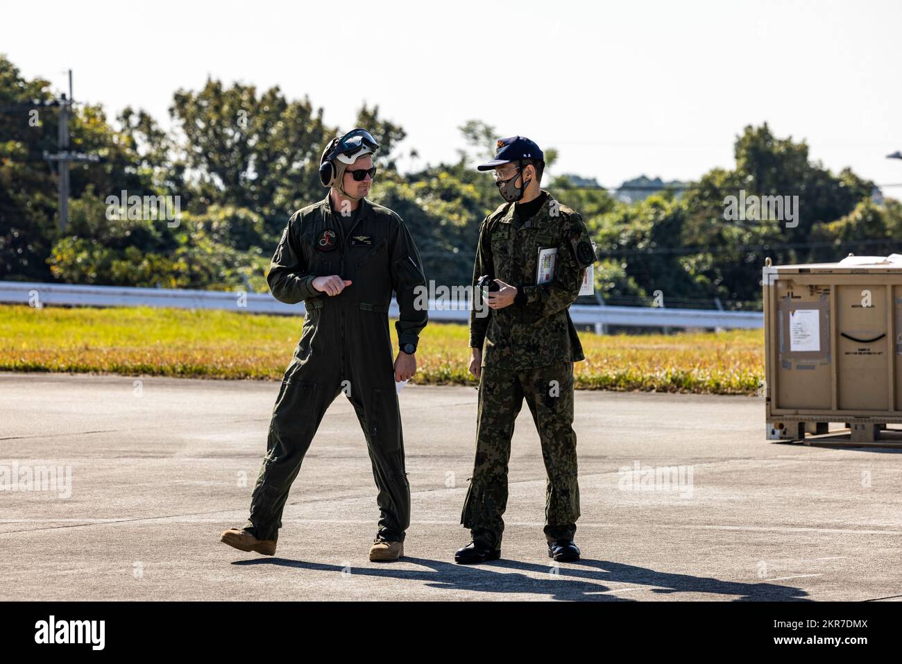 A U.S. Marine with Marine Medium Tiltrotor Squadron (VMM) 265 and a ...