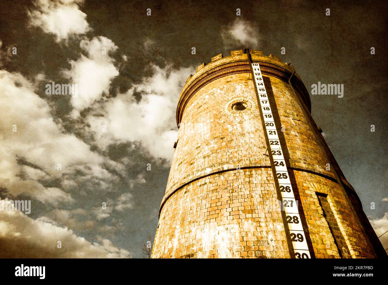 Textured antique architectural scene on an old rural water storage ...