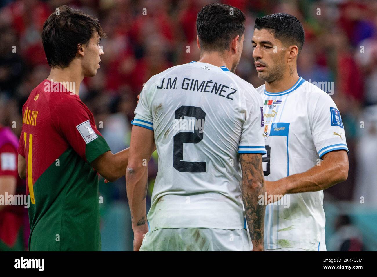 Joao Felix of Portugal thanks to Jose Maria Gimenez of Uruguay and Luis ...