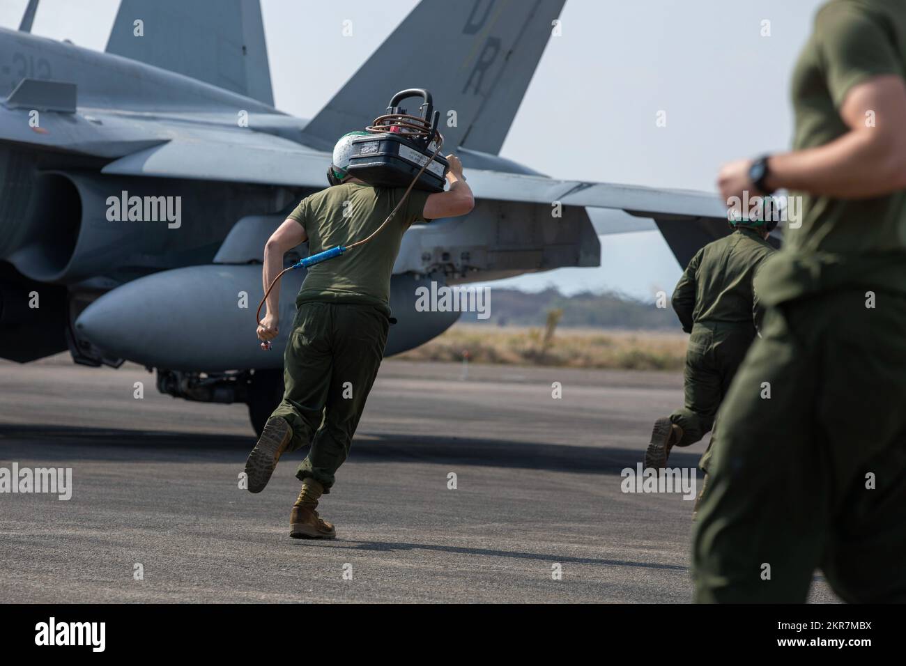 U.S. Marines with Marine Fighter Attack Squadron (VMFA) 312 deliver ...