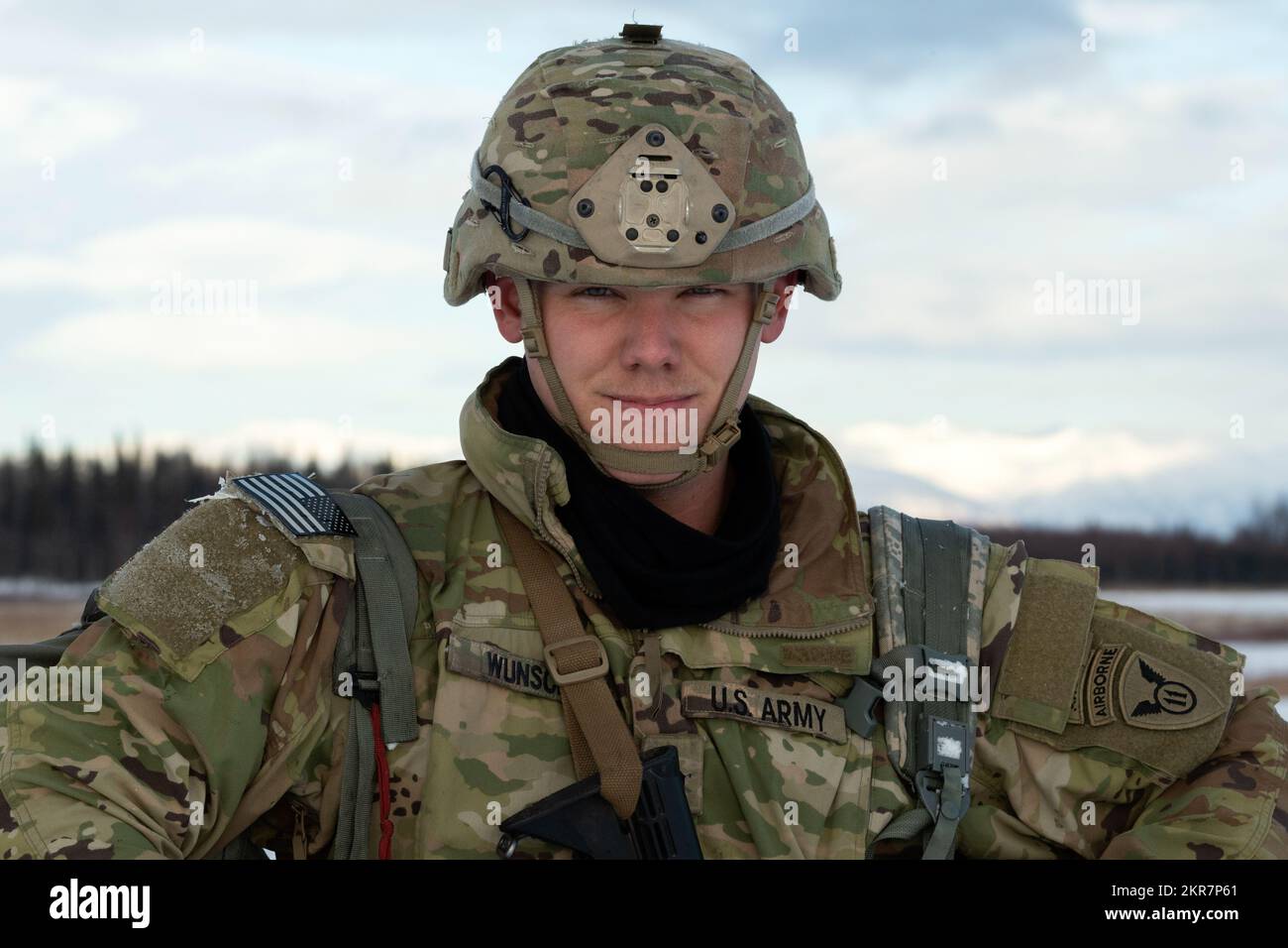 U.S. Army Pfc. Collin Wunsch, a paratrooper assigned to Alpha Battery ...