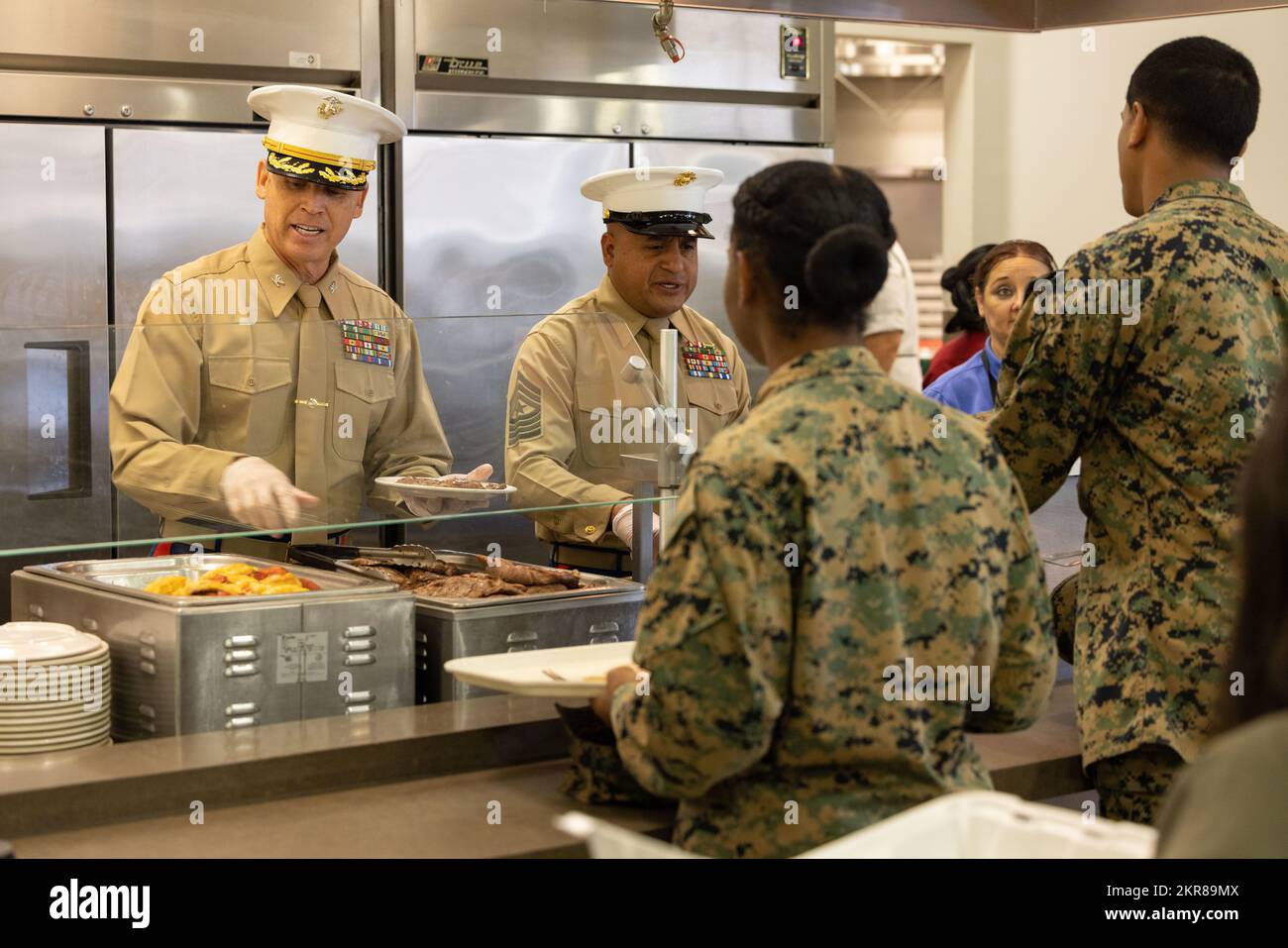 U.S. Marine Corps Col. Tracy Perry, left, the commanding officer of ...
