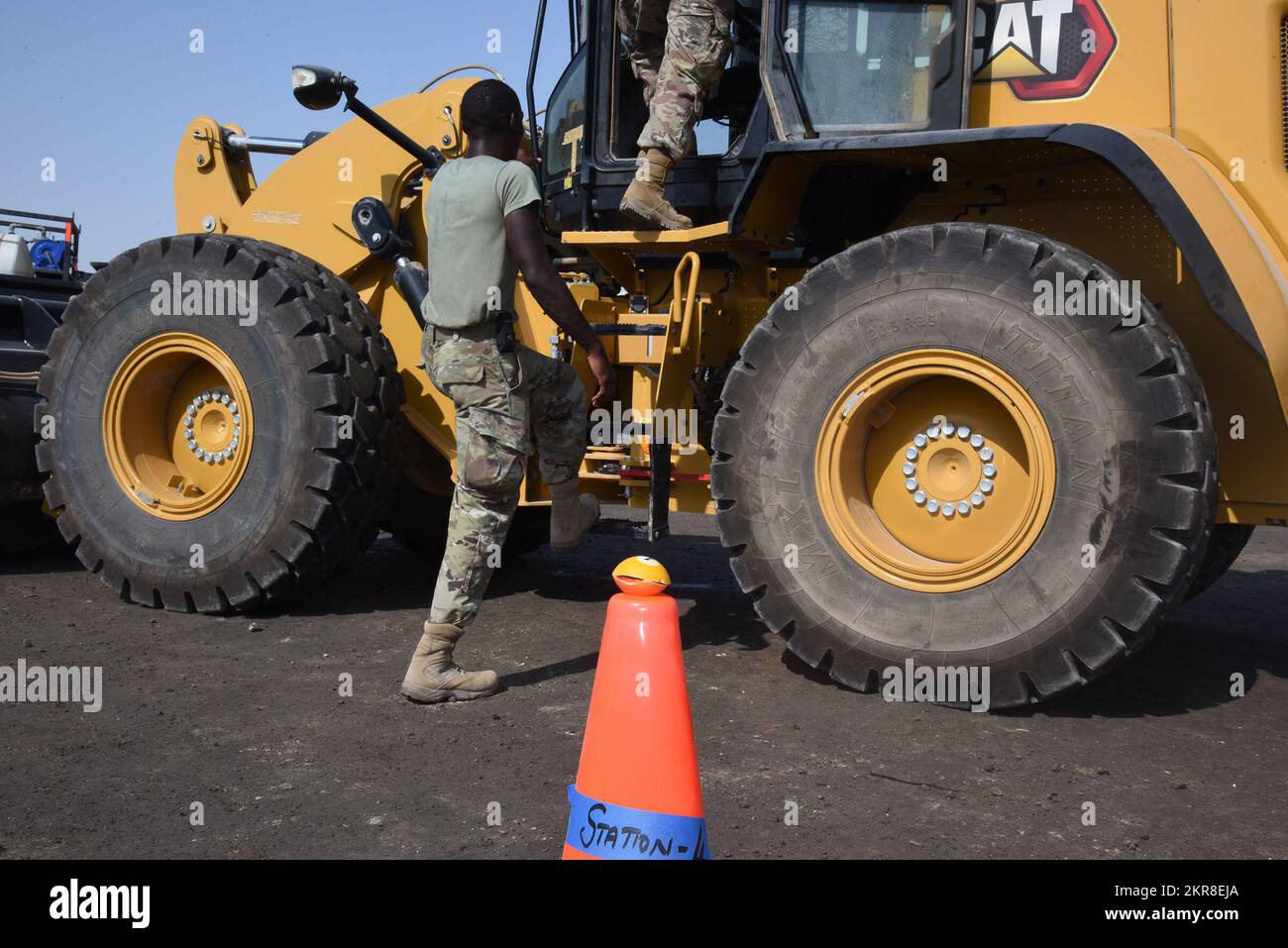 A crushed billiard ball sits on top of a construction cone after being ...