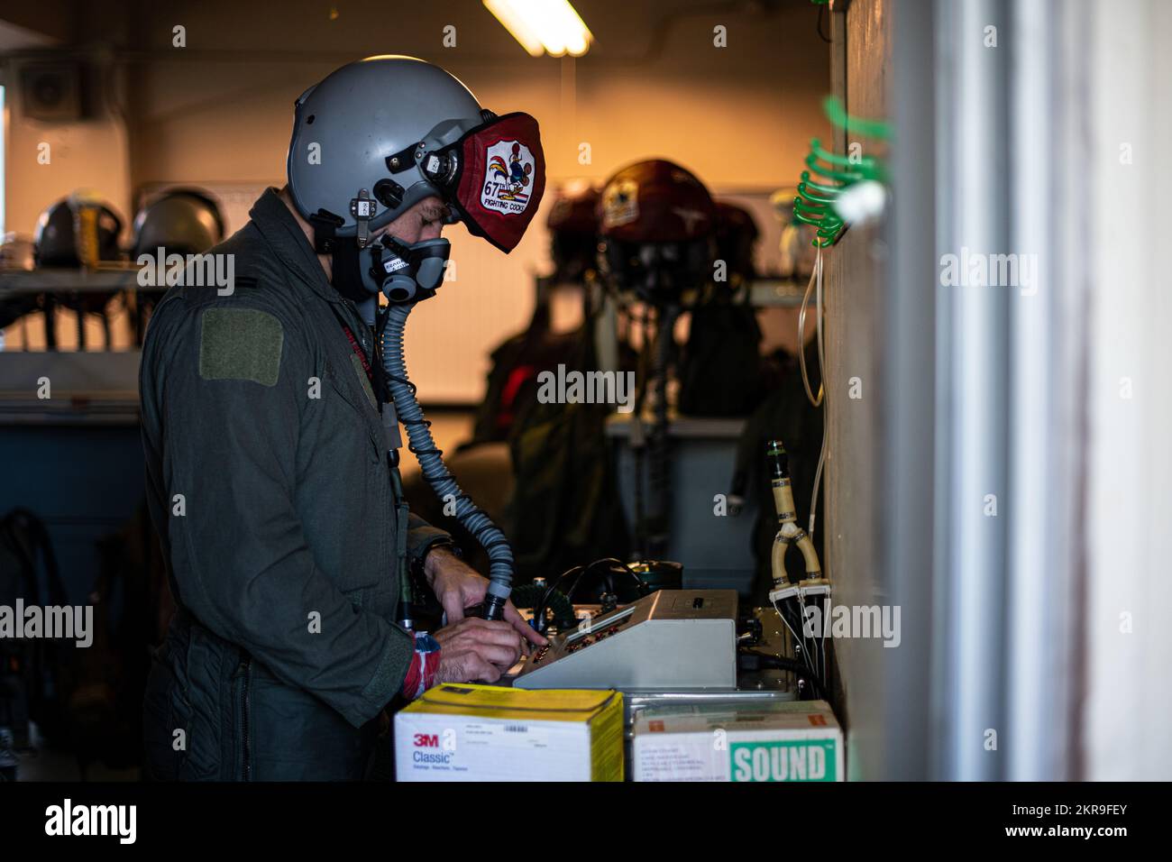 A 67th Fighter Squadron pilot conducts an oxygen mask test before a ...