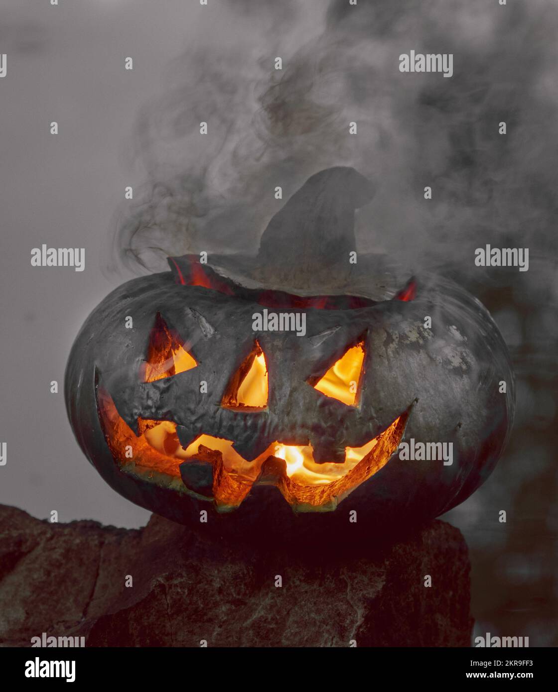 Halloween pumpkin it glows, fiery flame burns inside it Stock Photo - Alamy