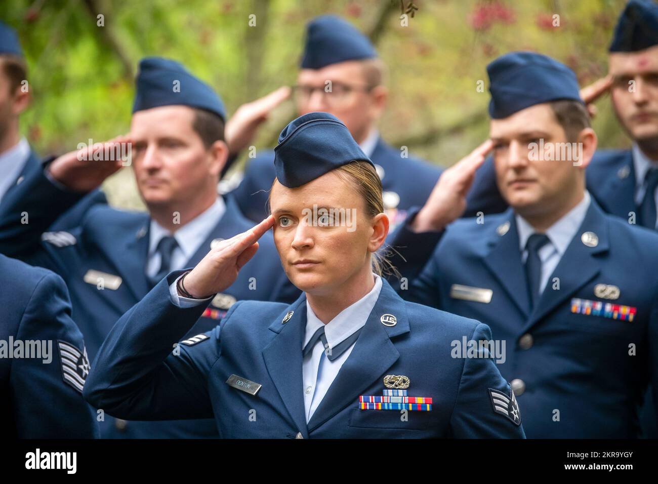 Airmen from the 420th Munitions Squadron, salute during a Remembrance Day ceremony at RAF ...
