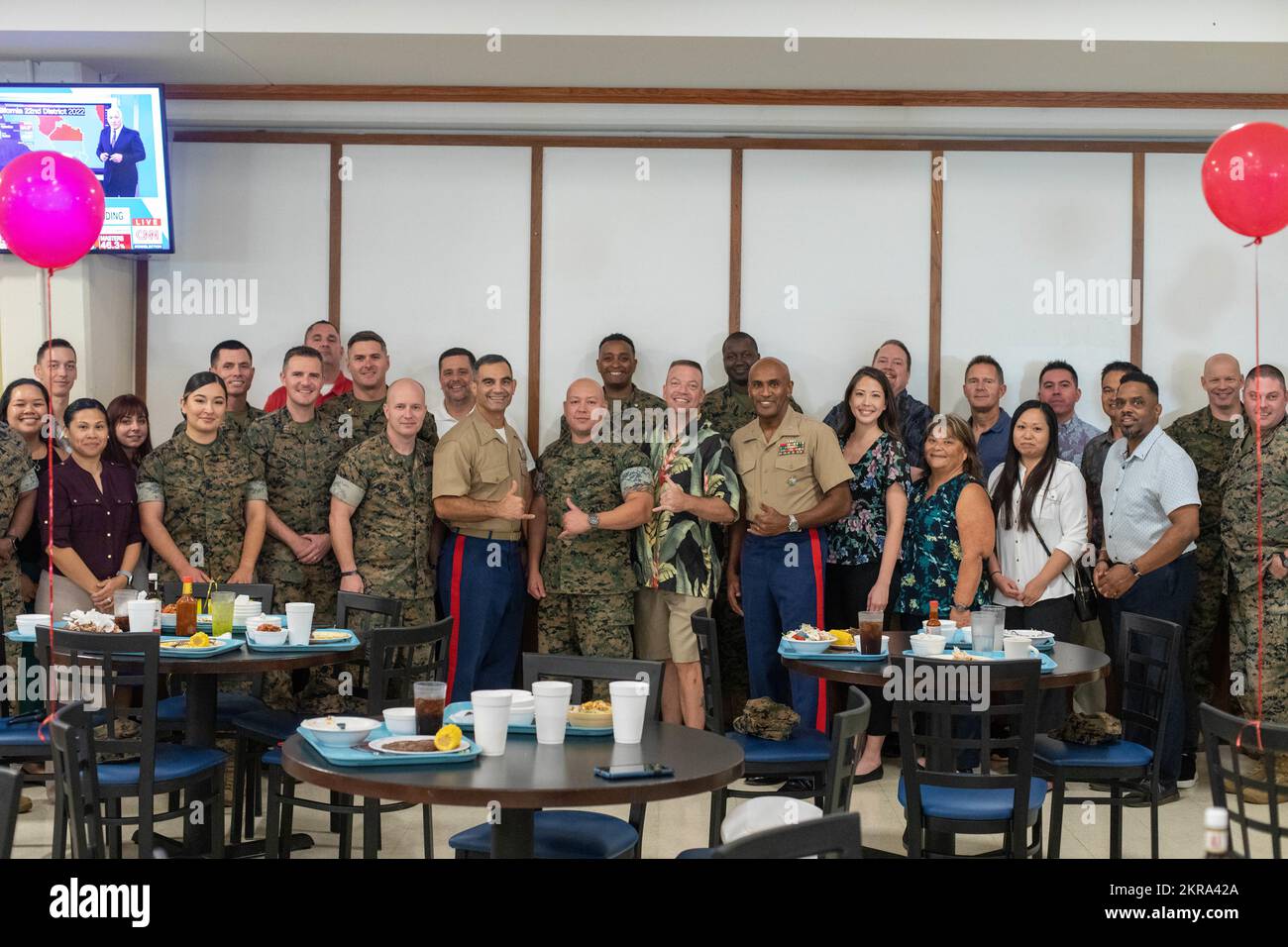 U.S. Marines and guests pose for a group photo during a birthday lunch ...