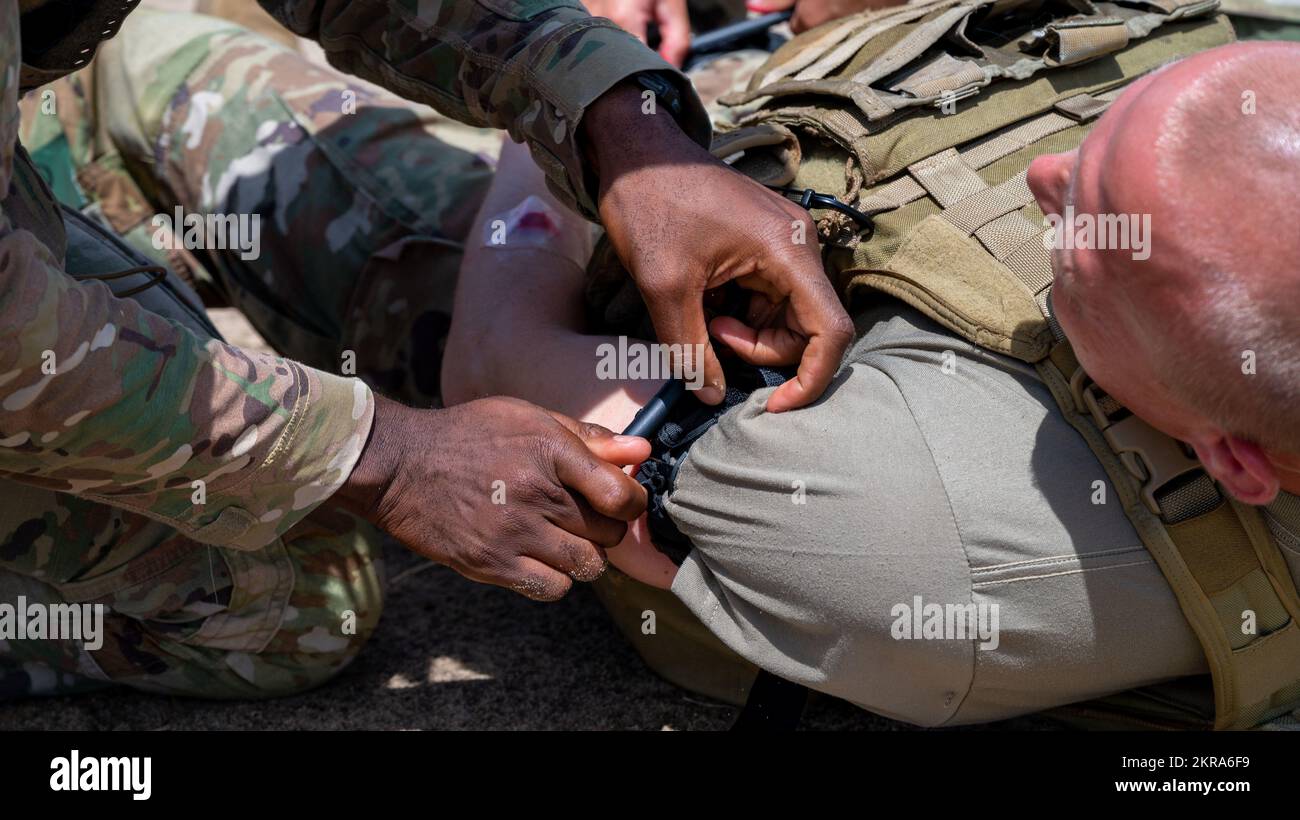 U.S. Army Sgt. Ibrahim Mkusa, left, a civil reconnaissance non ...