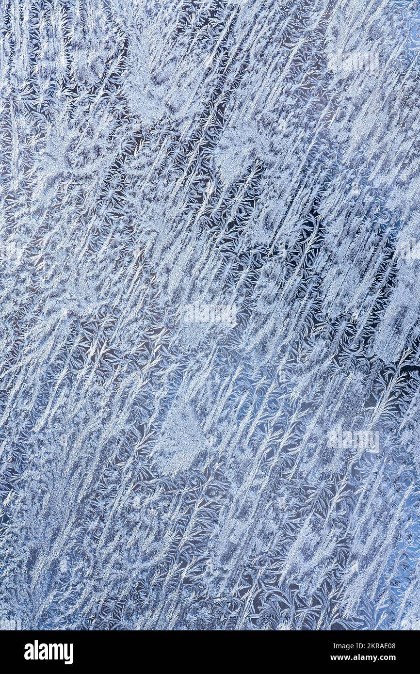 winter frost pattern on the window. natural ice texture on glass Stock ...