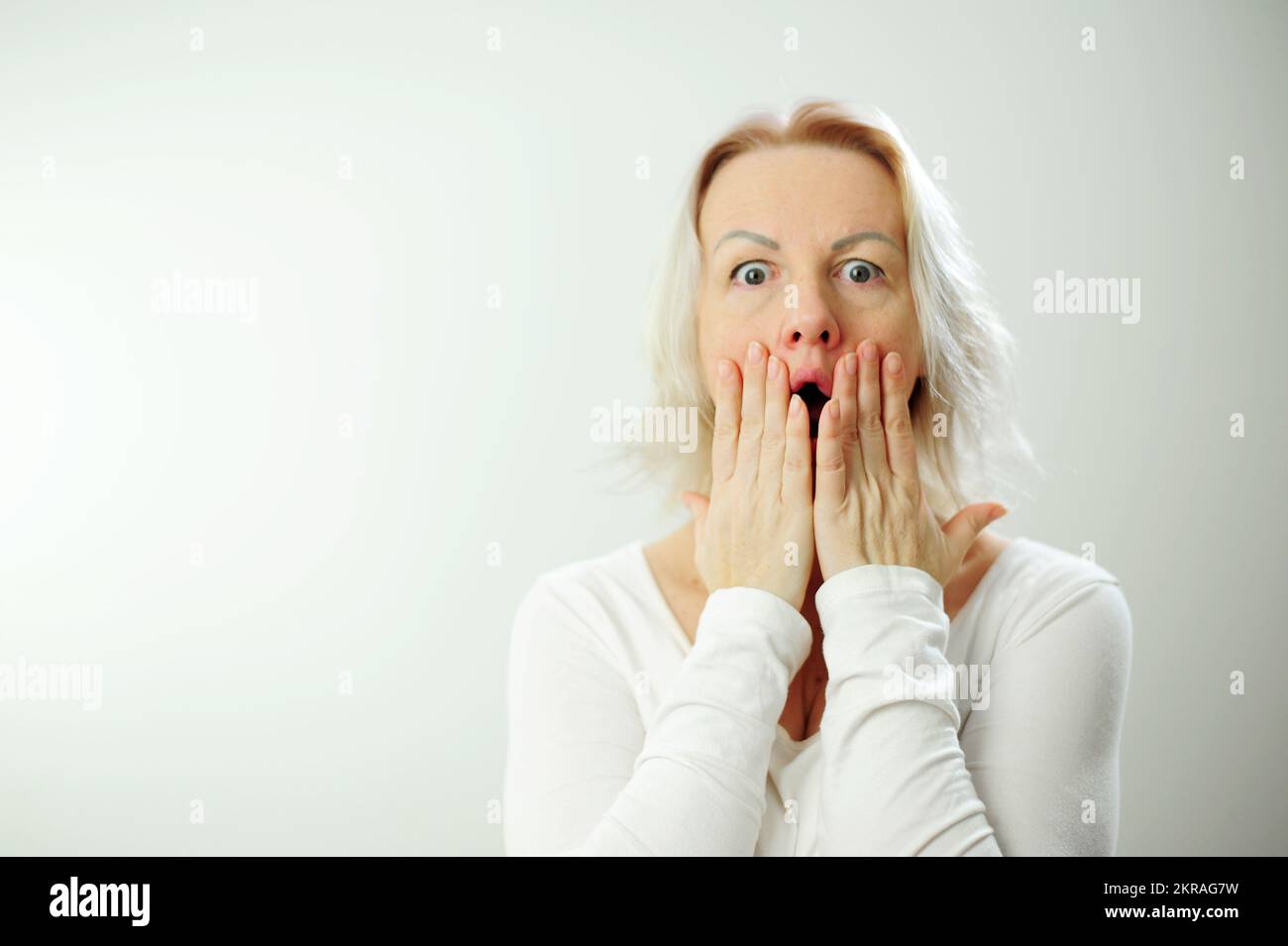 Positive and negative emotions Woman surprised she covered her open ...